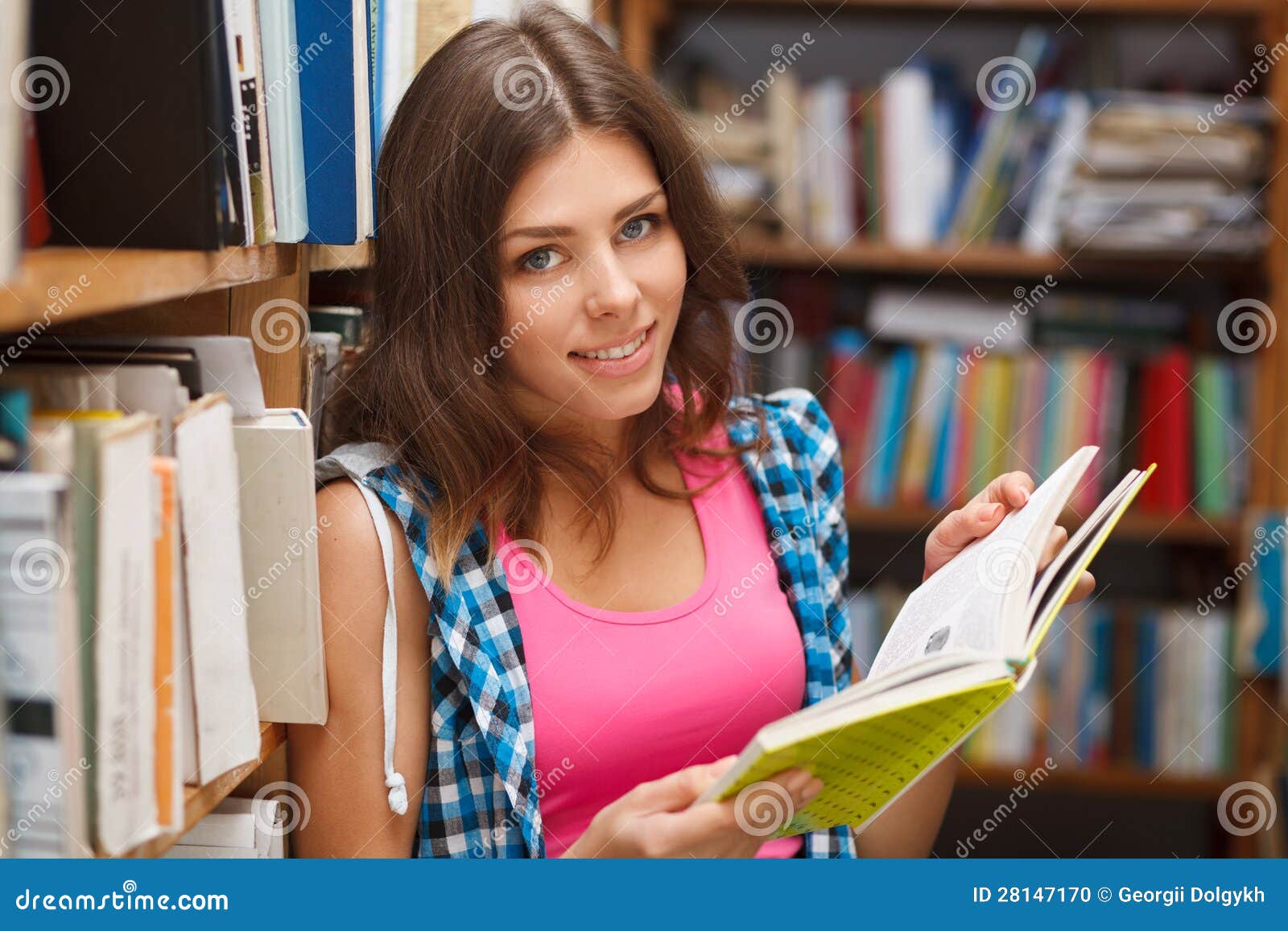 Beautiful Female Student in a Library Stock Photo - Image of female ...