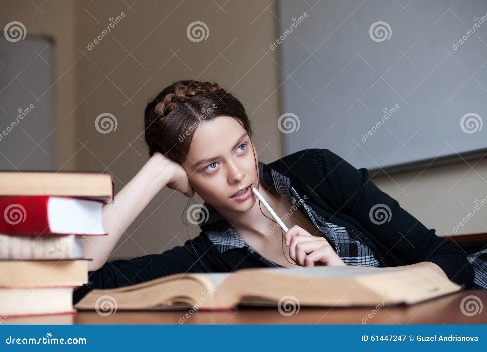Beautiful Female Student at a Table with Books Stock Image - Image of ...