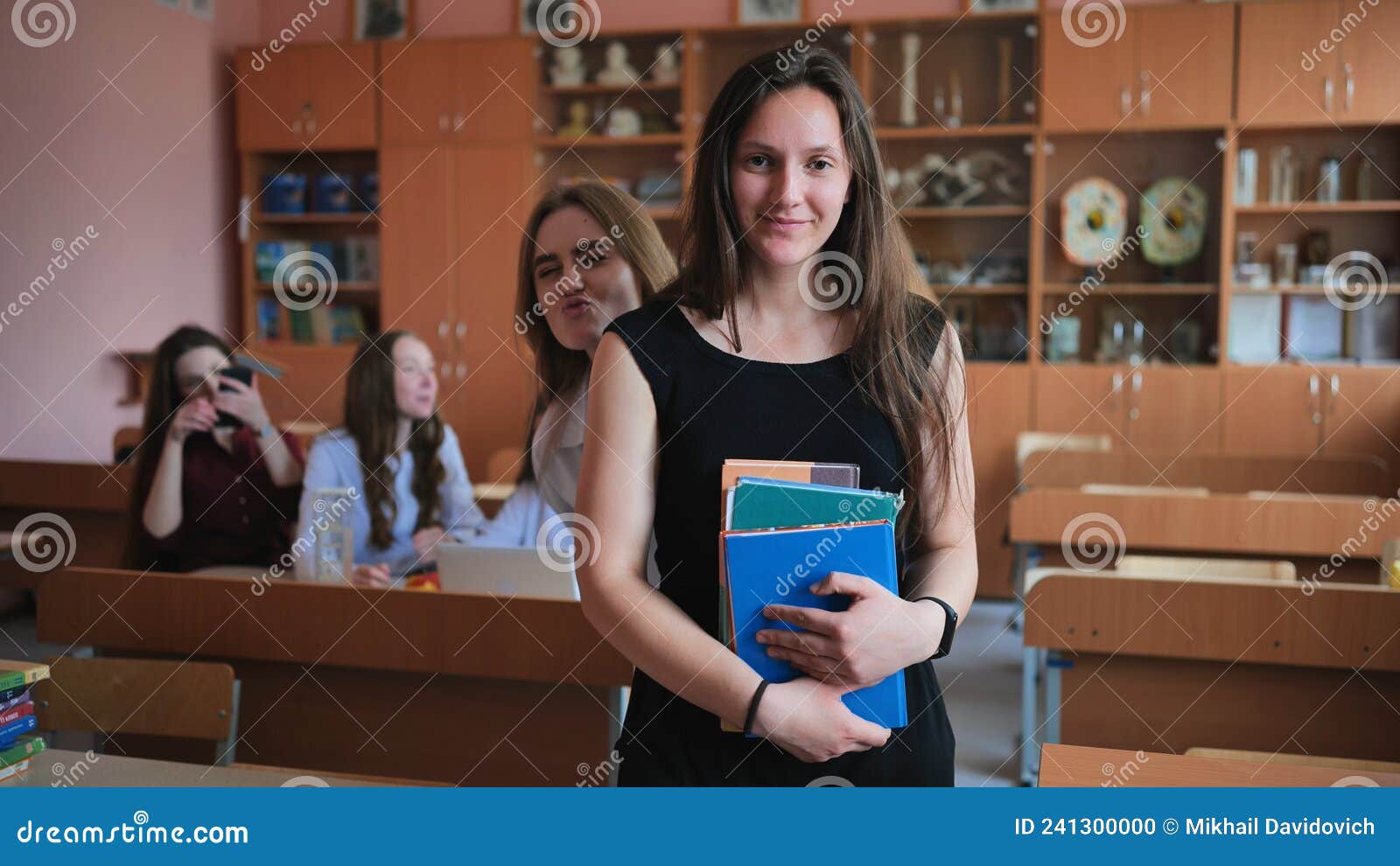 Beautiful Female Students are Posing in the Class. Stock Photo - Image ...
