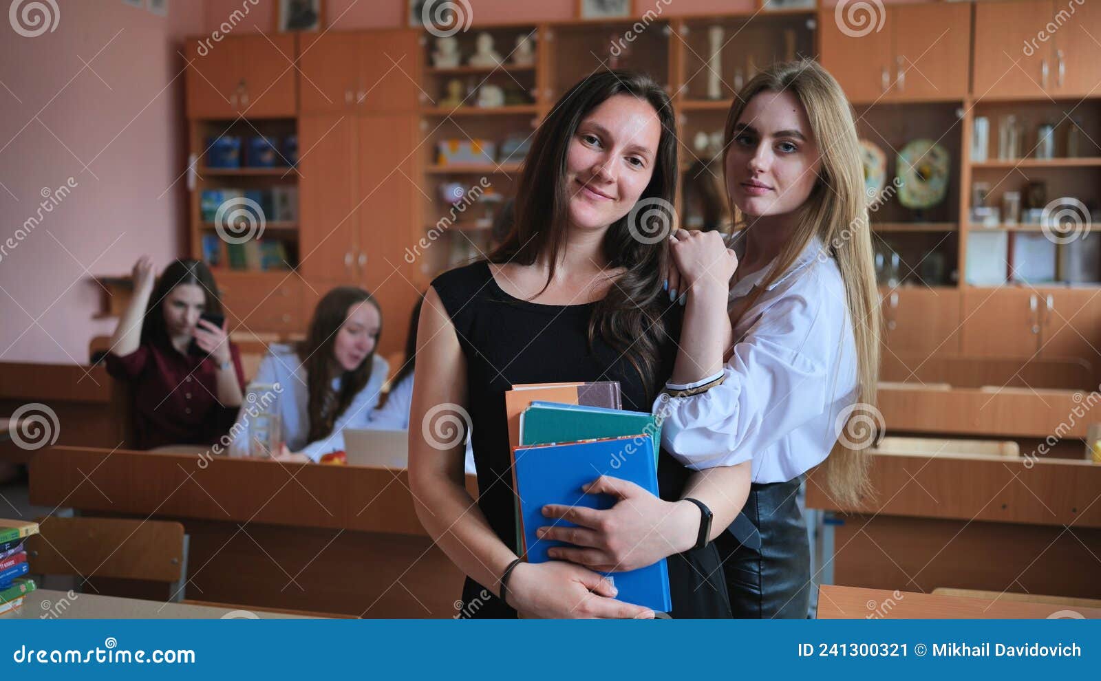 Beautiful Female Students are Posing in the Class. Stock Image - Image ...