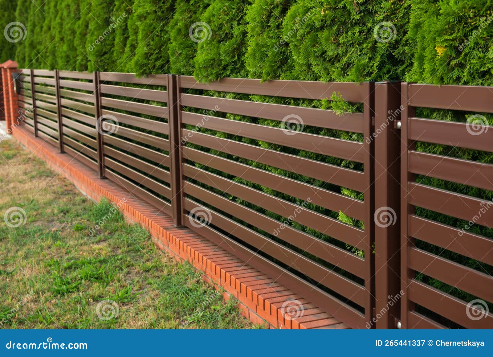 Beautiful Fence with Brick and Brown Iron Railing Stock Image - Image ...
