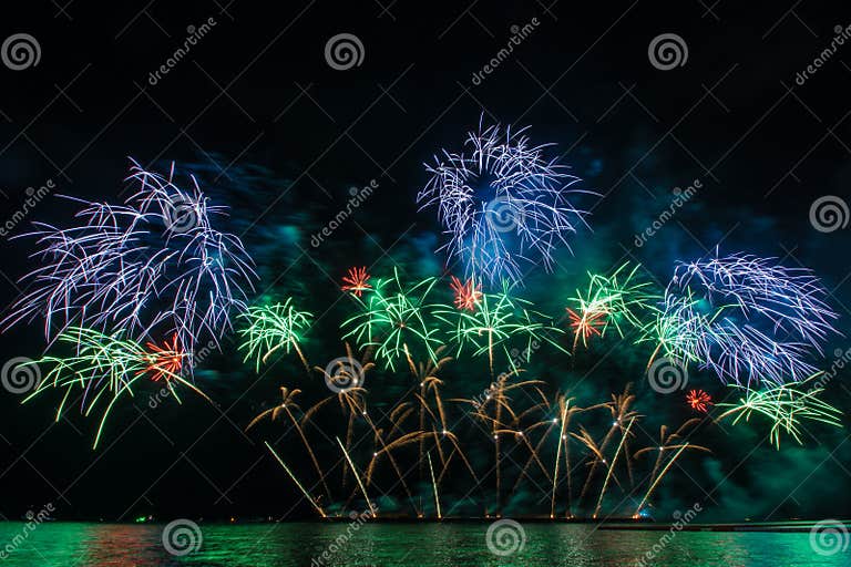 Firework Display for Celebration Over the Sea Stock Photo - Image of ...