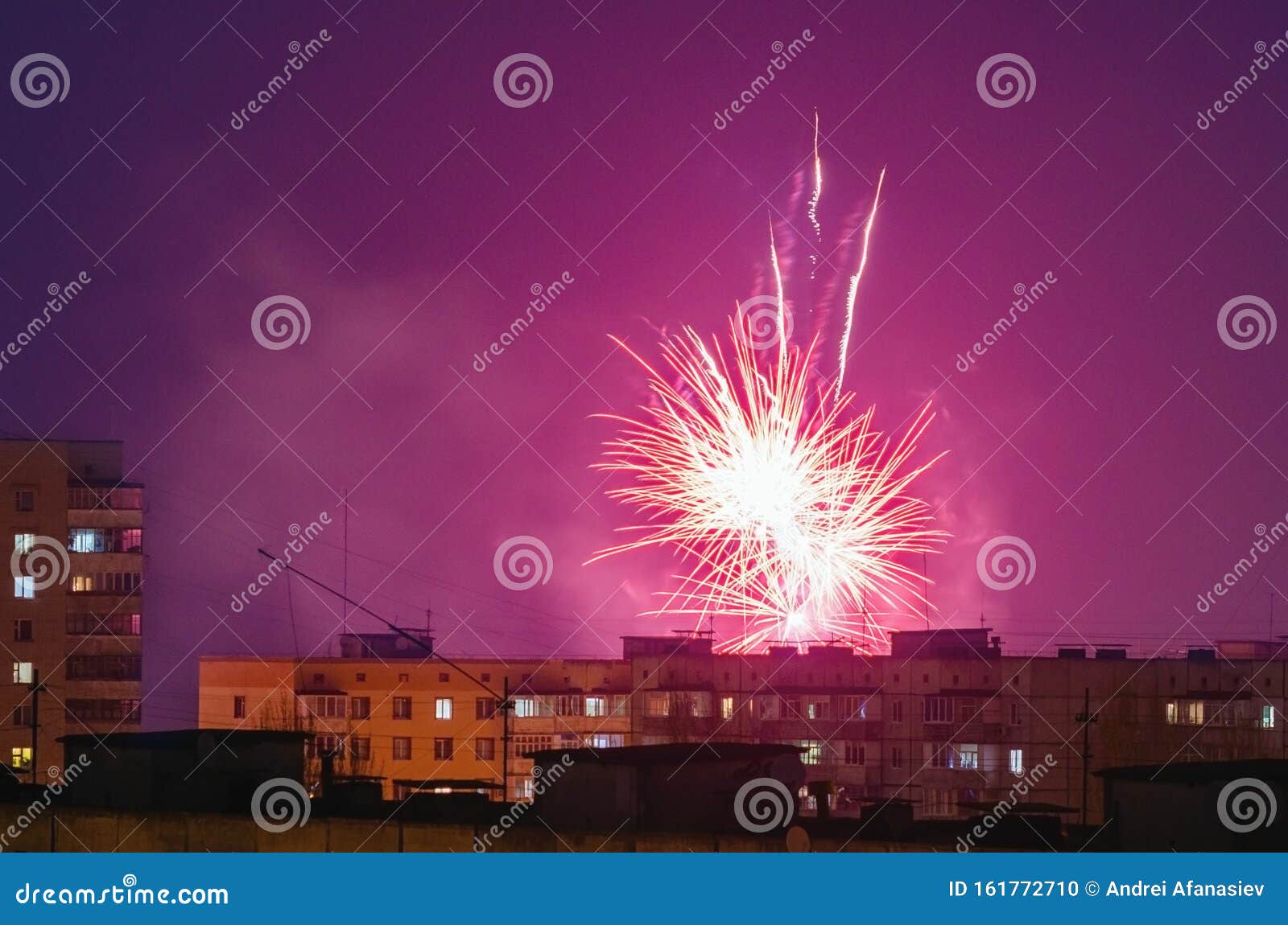 Beautiful Fireworks Over the Roofs of Houses Stock Photo - Image of ...