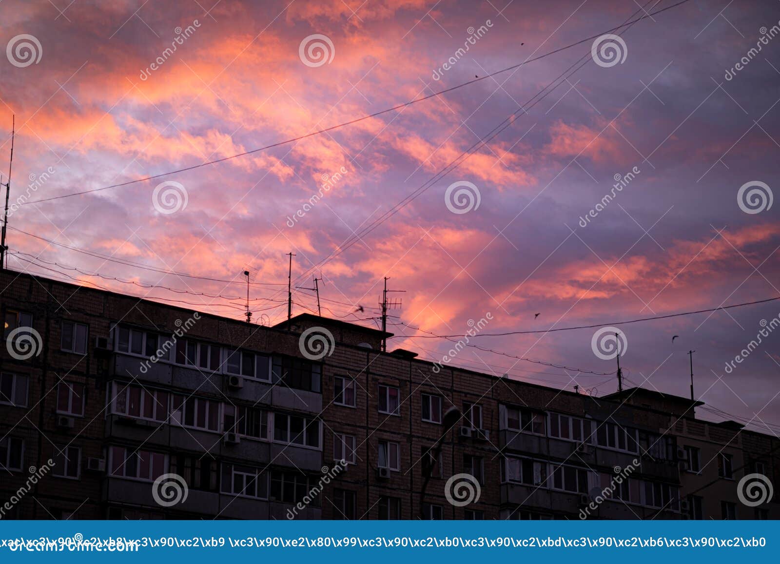 Beautiful Floating Clouds Bright Red Float Over the Cityscape Stock ...
