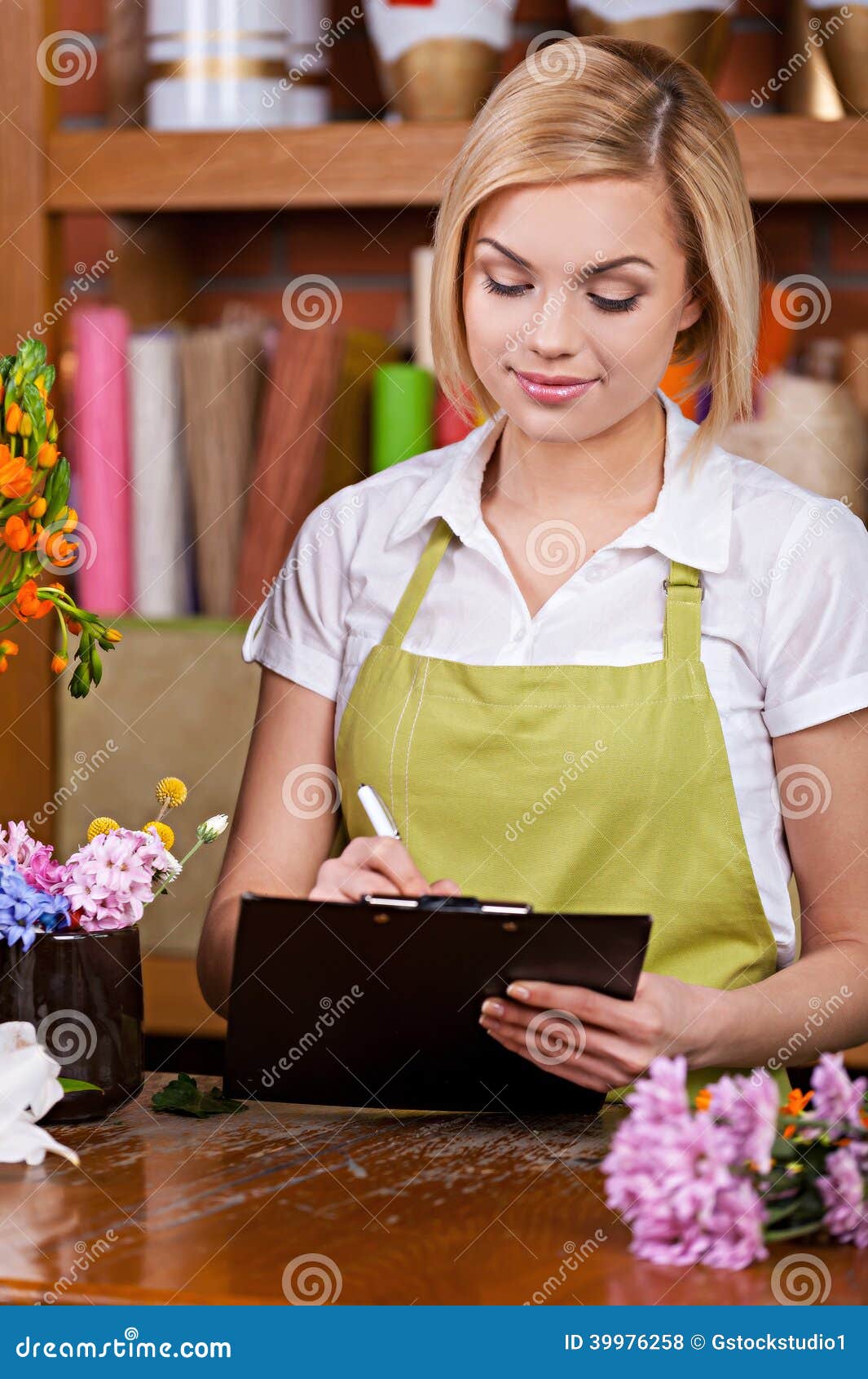 Beautiful florist at work. stock photo. Image of arrangement - 39976258