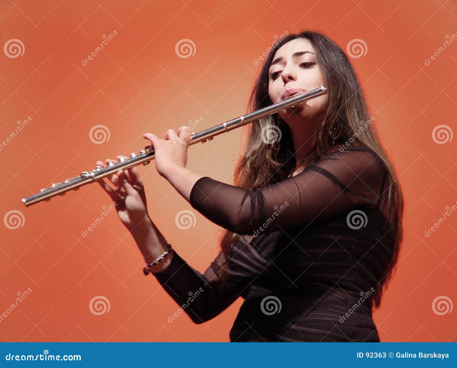 Beautiful Flutist stock image. Image of melody, enjoy, enjoying - 92363