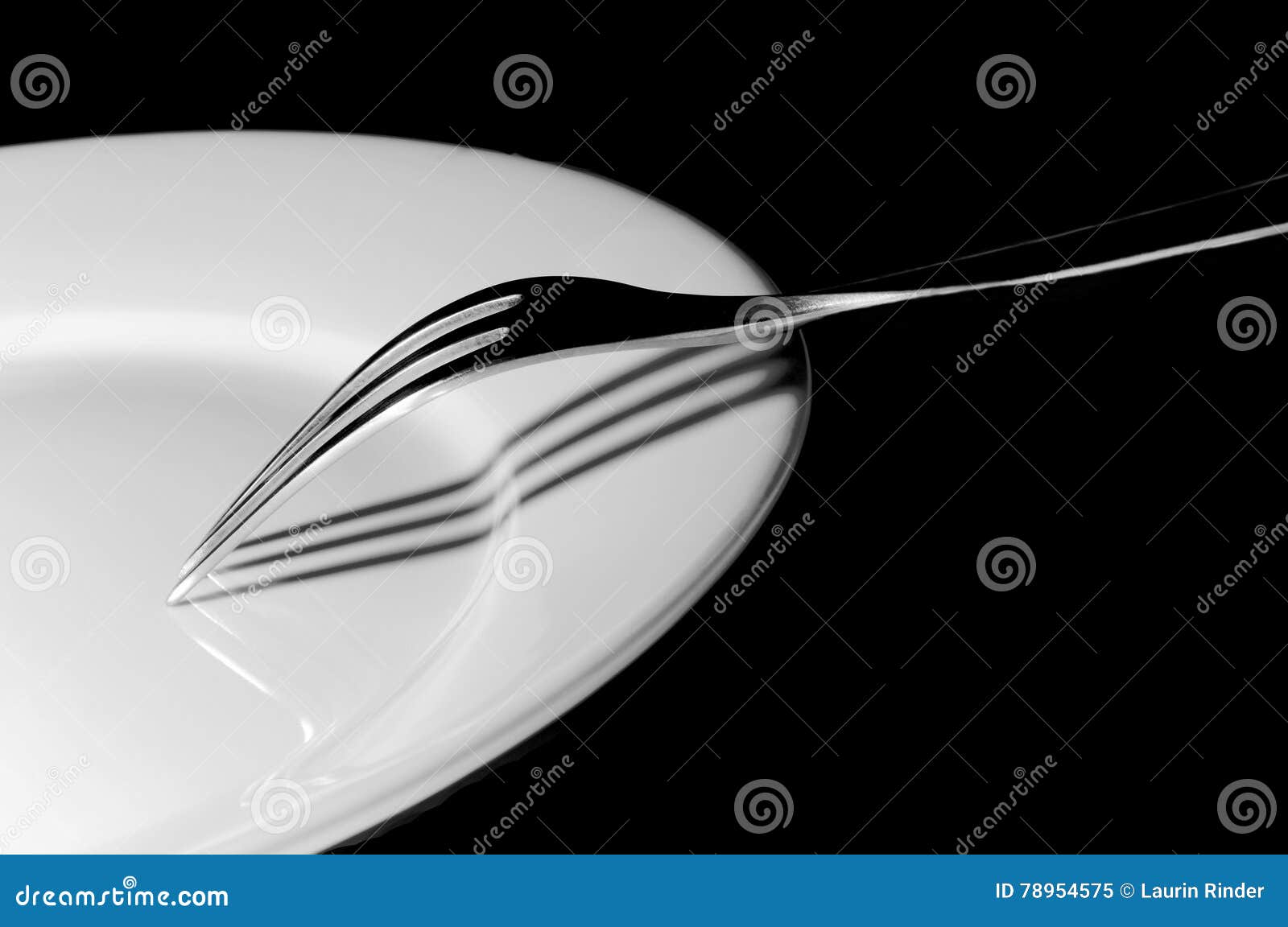 A Beautiful Fork on White Plate Stock Image - Image of shallow, decor ...
