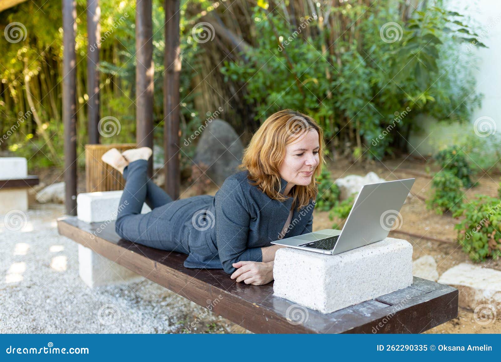 A Beautiful Freelancer Woman Works at the Park Stock Image - Image of ...