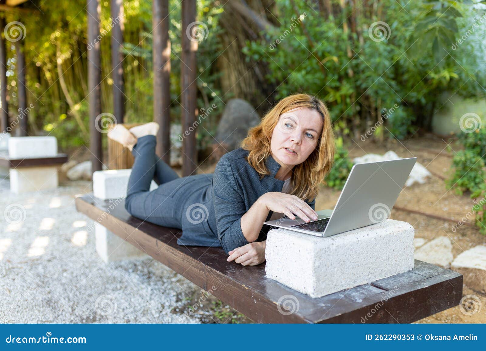 A Beautiful Freelancer Woman Works at the Park Stock Image - Image of ...