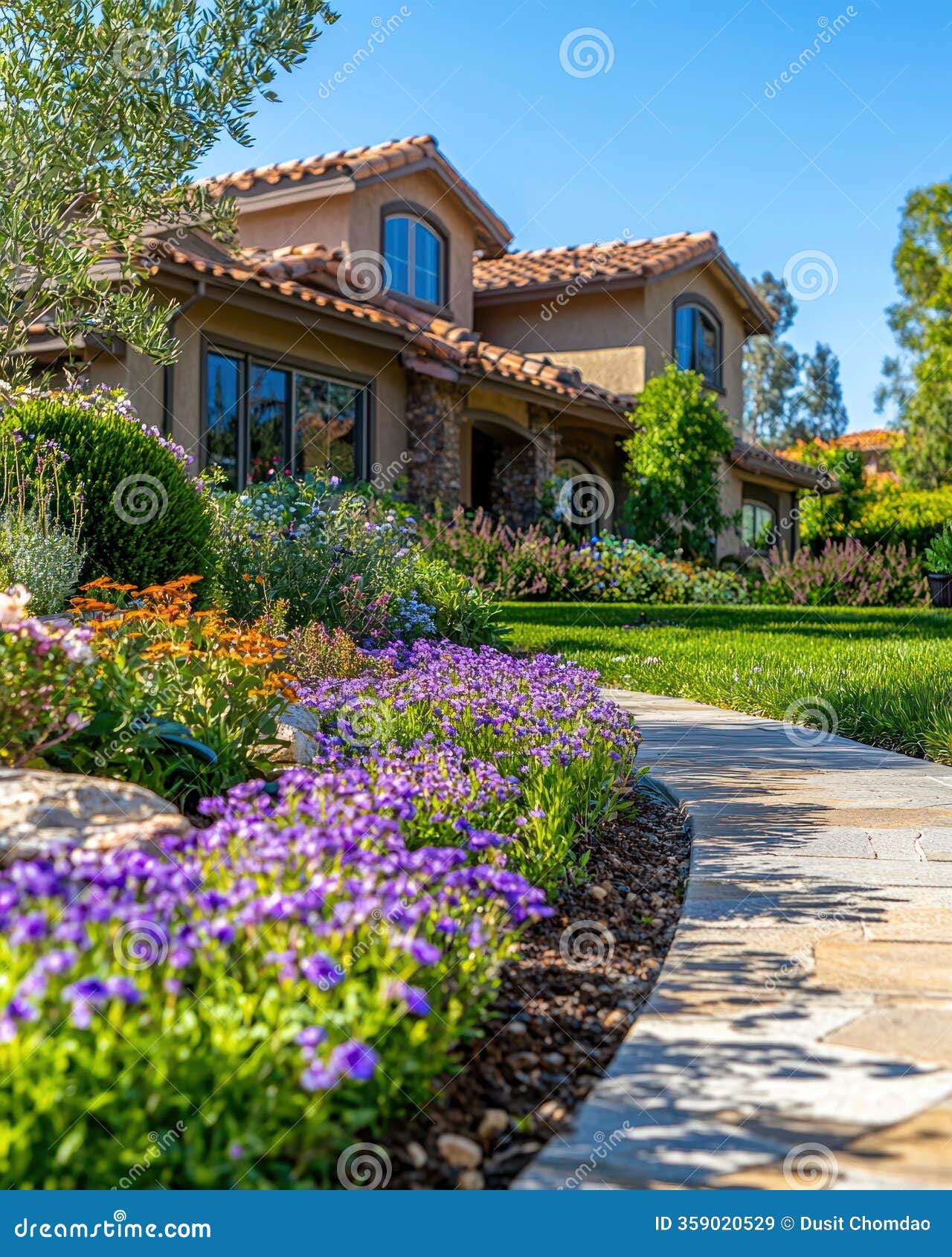 Beautiful Front Yard with Colorful Landscaping and Stone Pathway Stock ...
