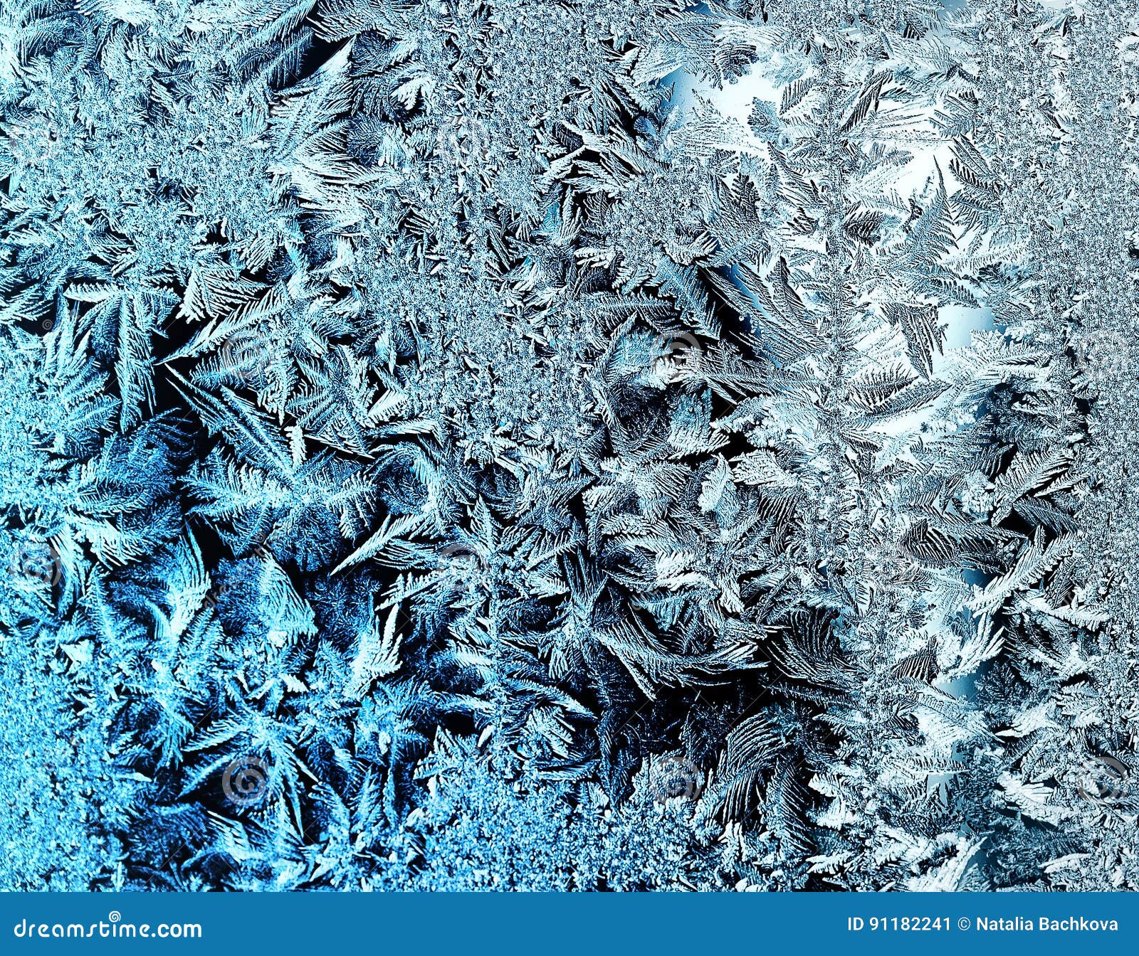 Beautiful Frosty Pattern with Swirls and Feathers on Cold Glass Stock ...