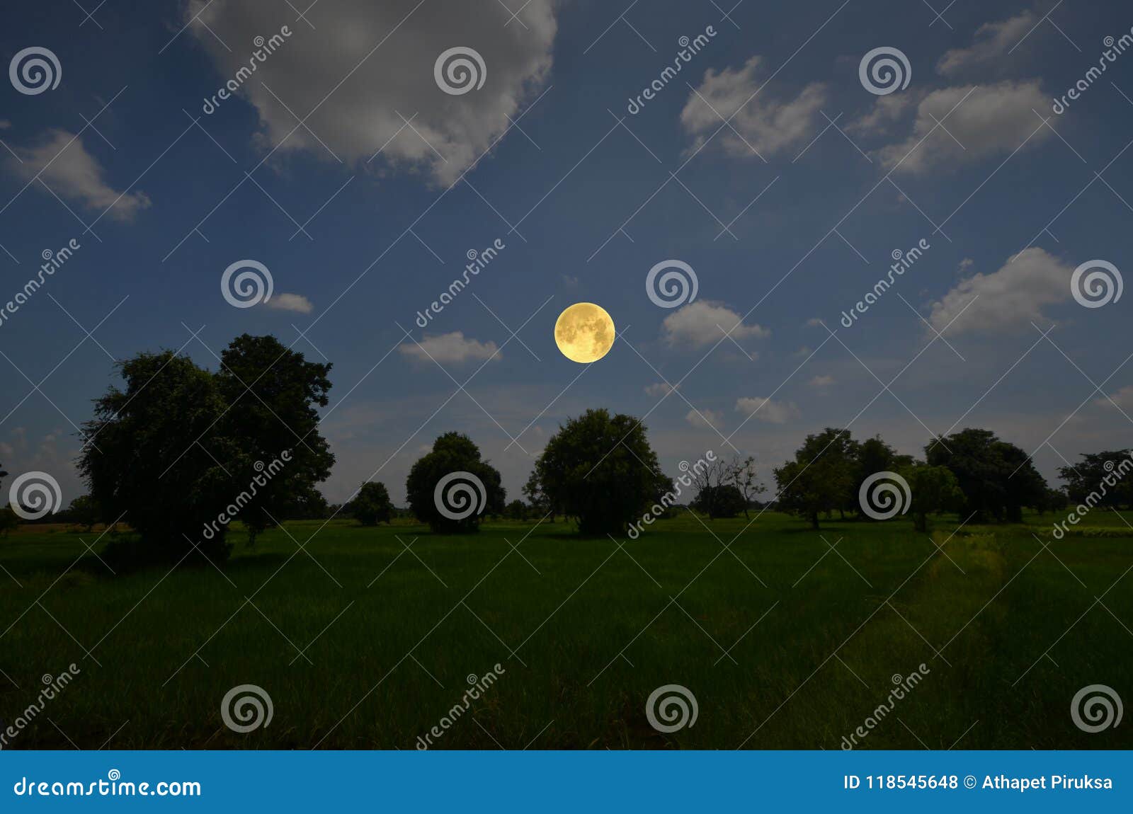 Beautiful Full Moon and White Clouds Over the Field Stock Photo - Image ...