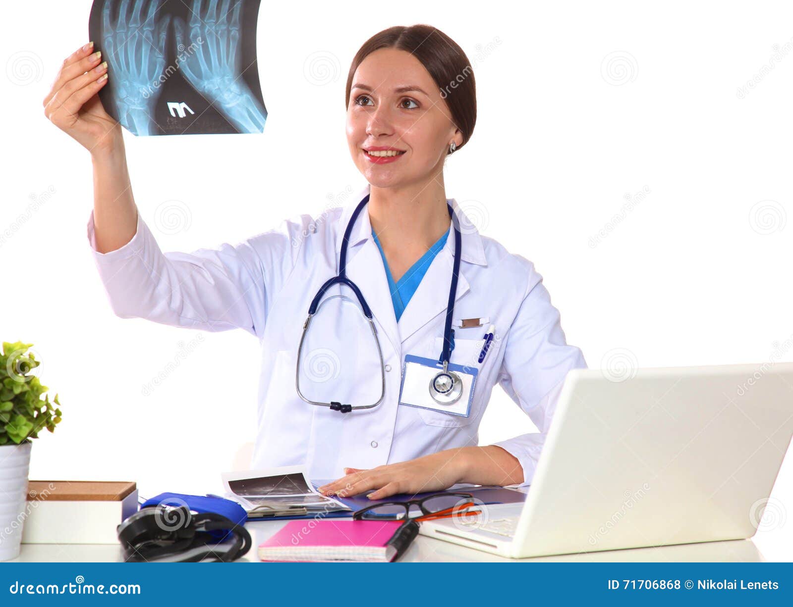 Beautiful General Practitioner is Working with Joy. she is Standing ...