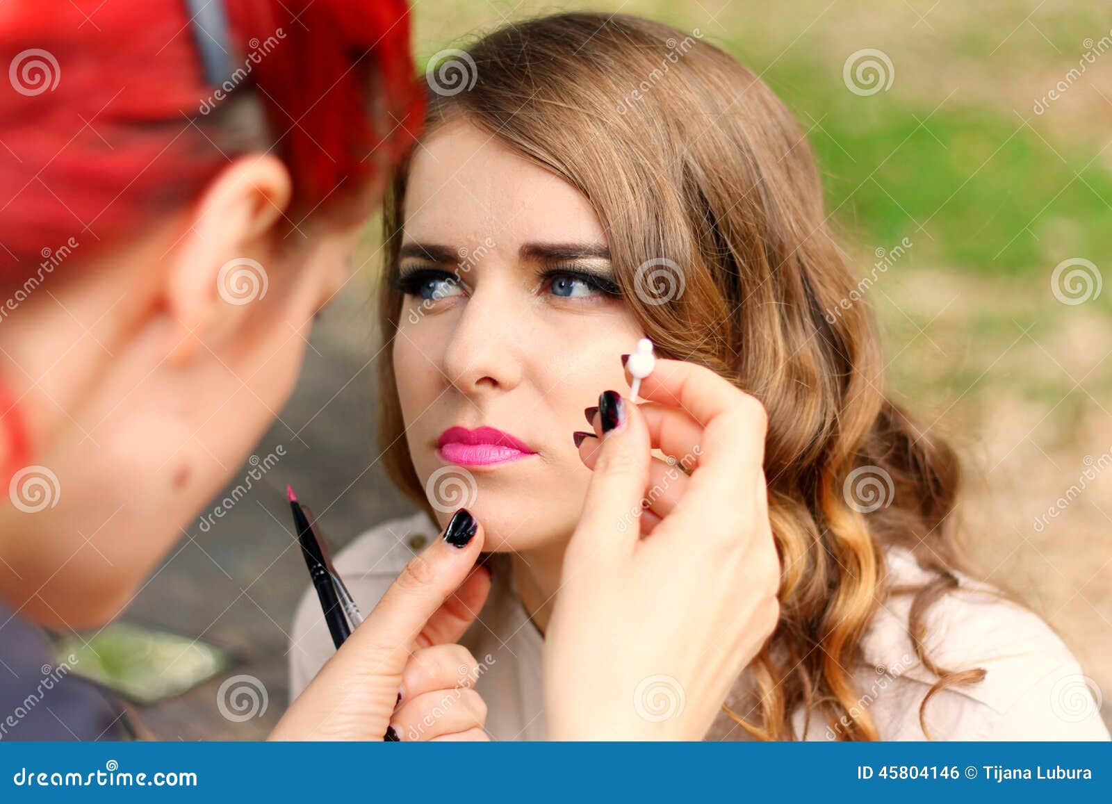 Beautiful Girl Applying Makeup Stock Photo - Image of people, pink ...
