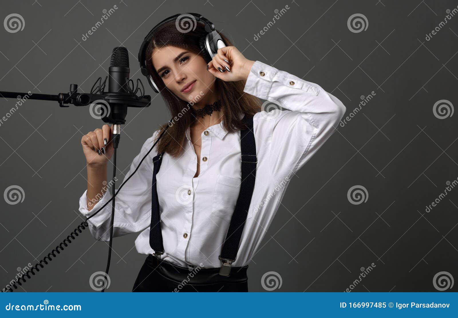 Beautiful Girl on the Background of a Studio Microphone Stock Image ...