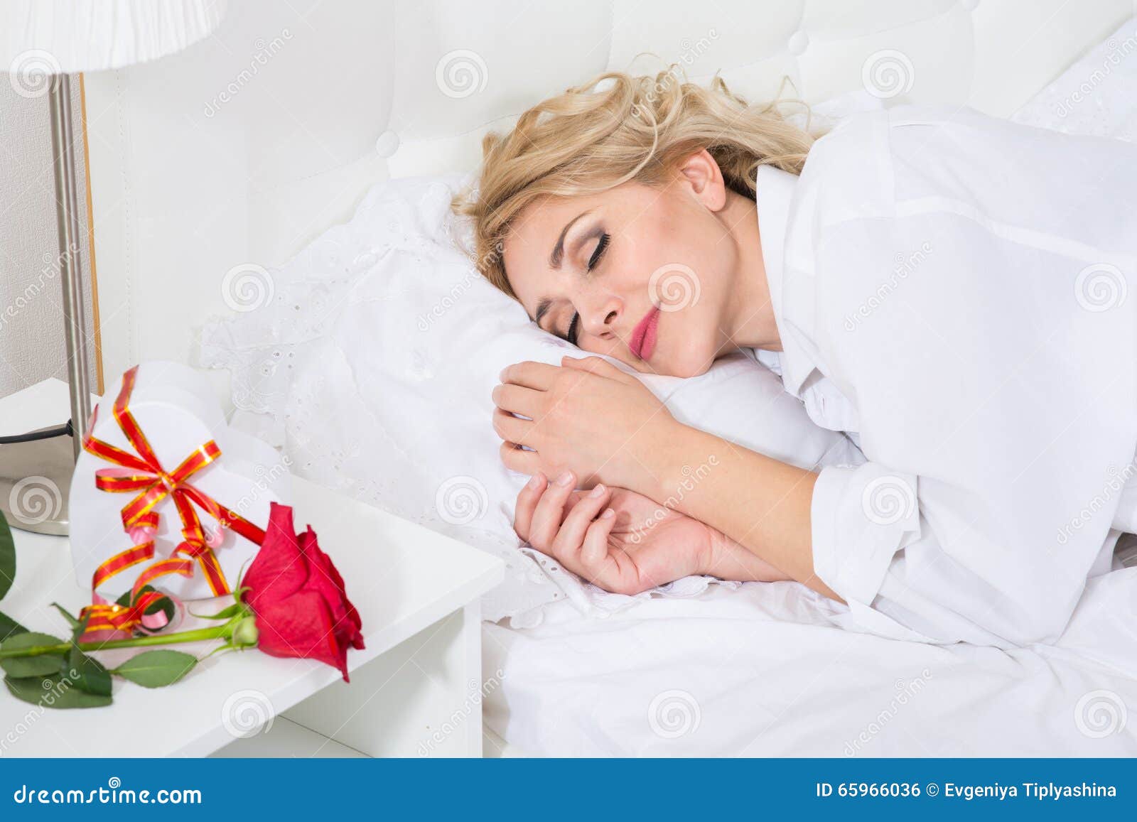 Beautiful girl on bed stock photo. Image of portrait - 65966036