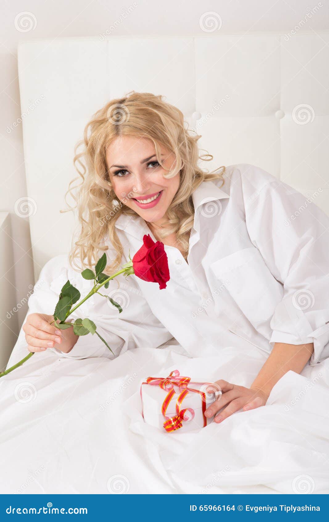 Beautiful girl on bed stock photo. Image of beauty, happy - 65966164