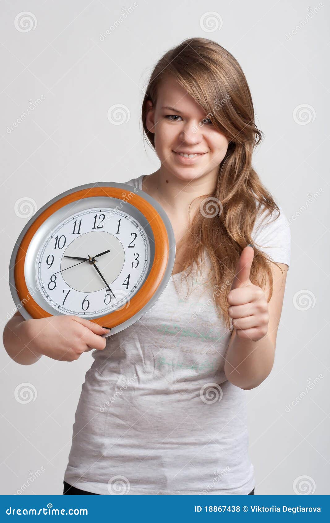 Beautiful Girl with a Big Clock Stock Photo - Image of female, arrow ...