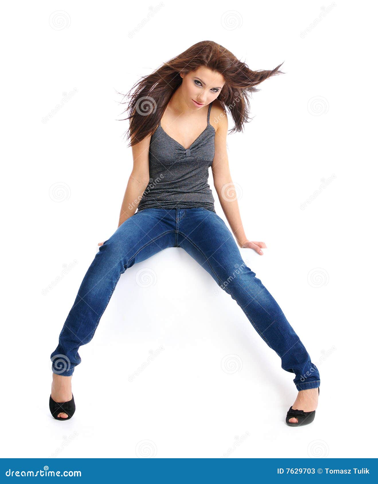 Beautiful Girl in Blue Jeans Stock Image - Image of pretty, sitting ...