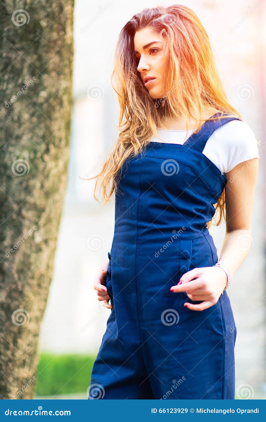 Beautiful girl stock image. Image of overalls, girl, woman - 66123929