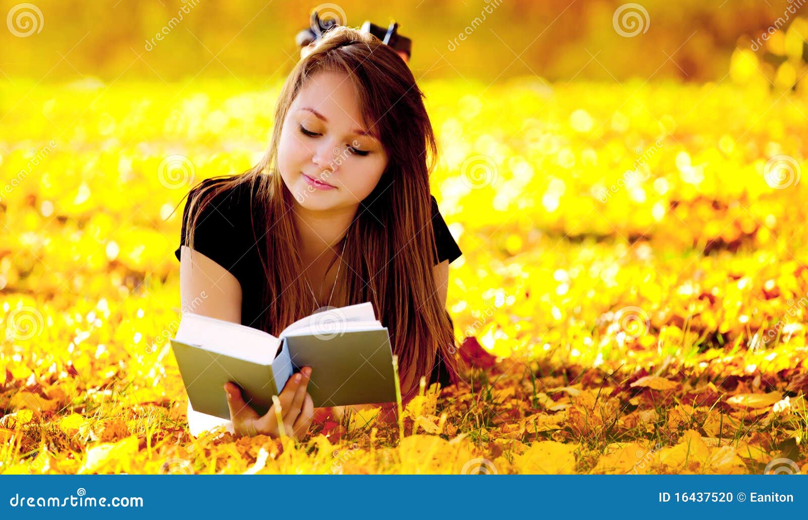Beautiful girl with book stock photo. Image of brunette - 16437520