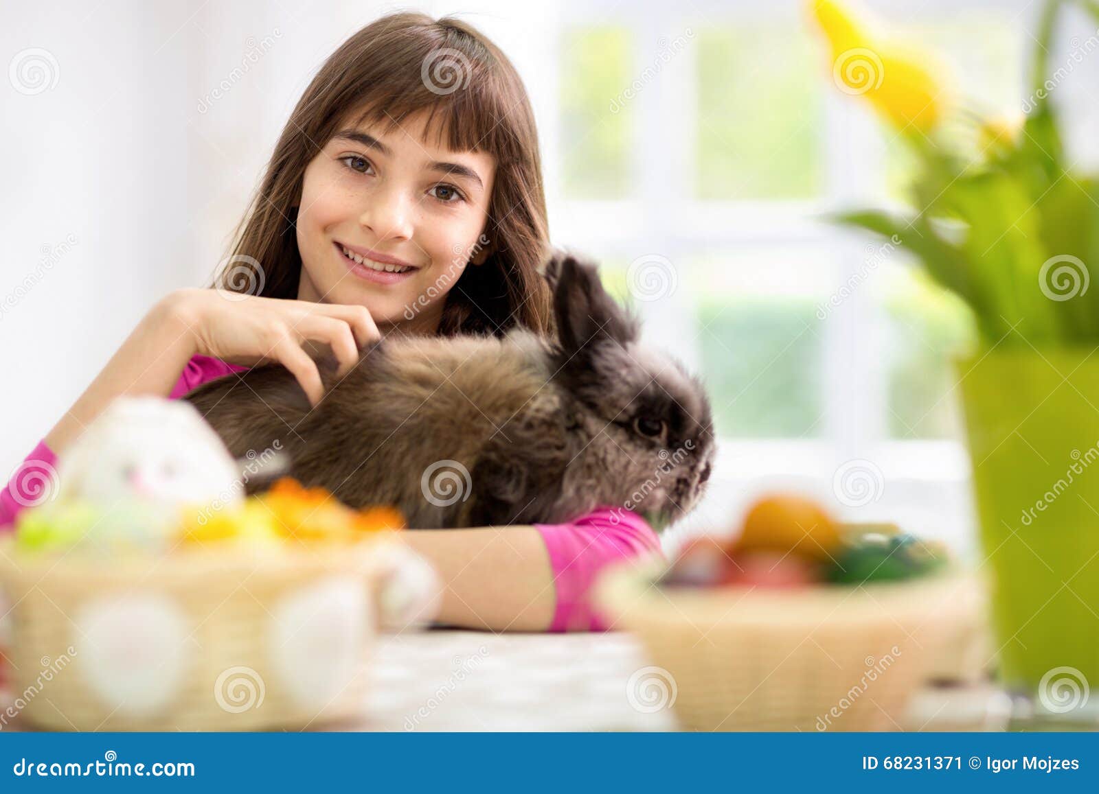 Beautiful girl with bunny stock image. Image of person - 68231371