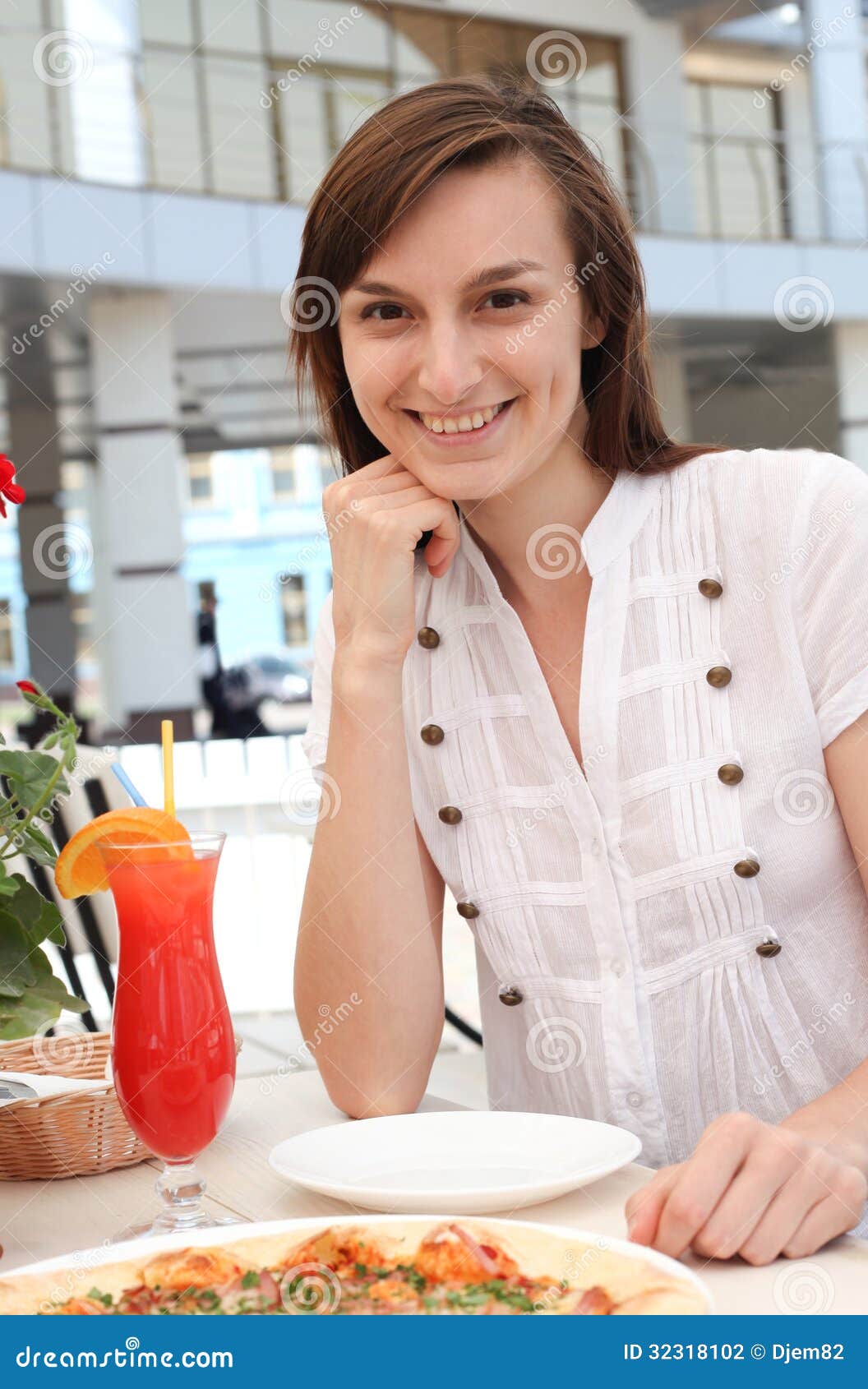 Beautiful girl in a cafe stock photo. Image of attractive - 32318102