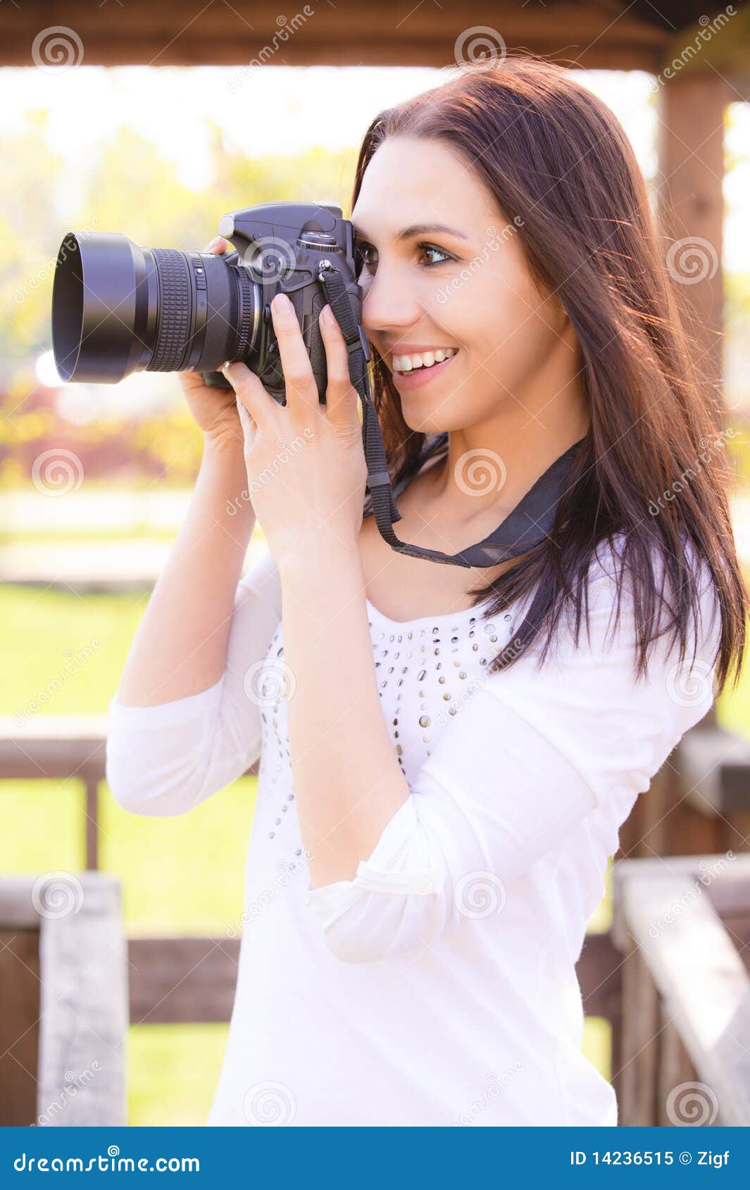 Beautiful girl with camera stock image. Image of cute - 14236515