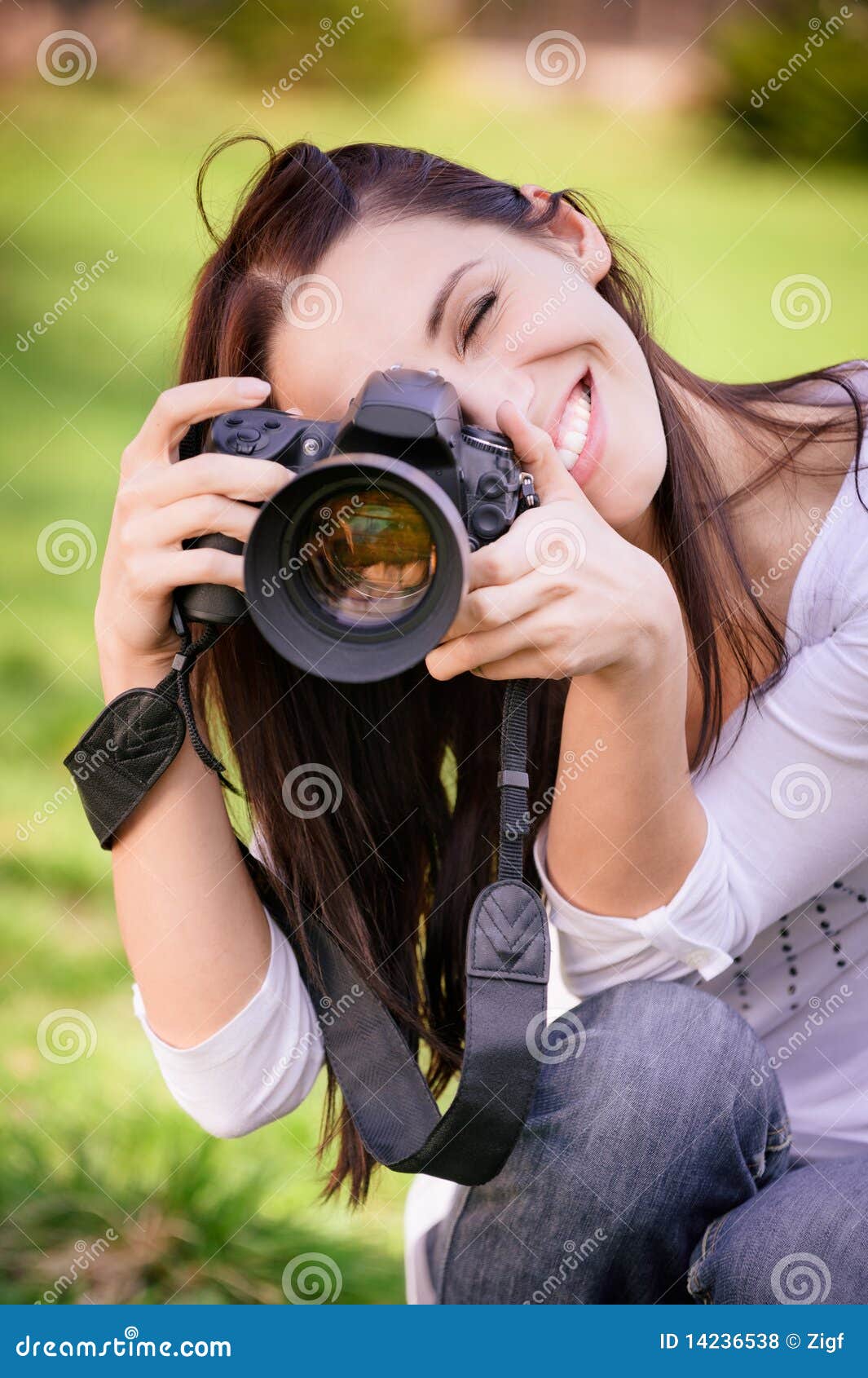 Beautiful girl with camera stock photo. Image of head - 14236538