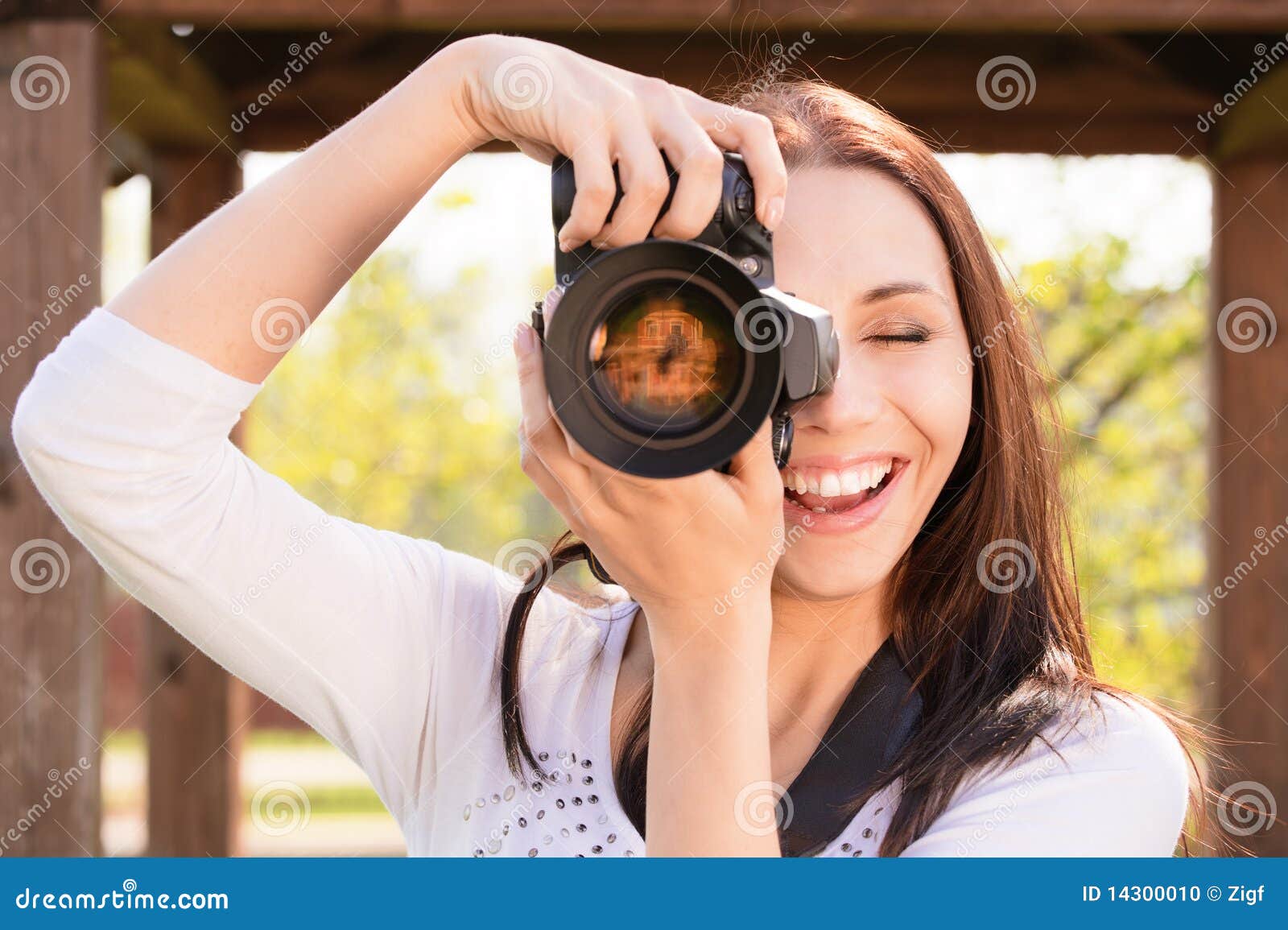 Beautiful girl with camera stock photo. Image of enjoying - 14300010