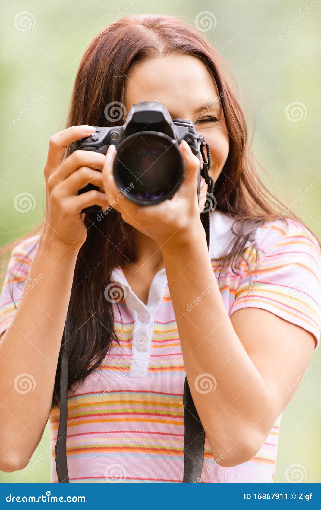 Beautiful girl with camera stock image. Image of attractive - 16867911