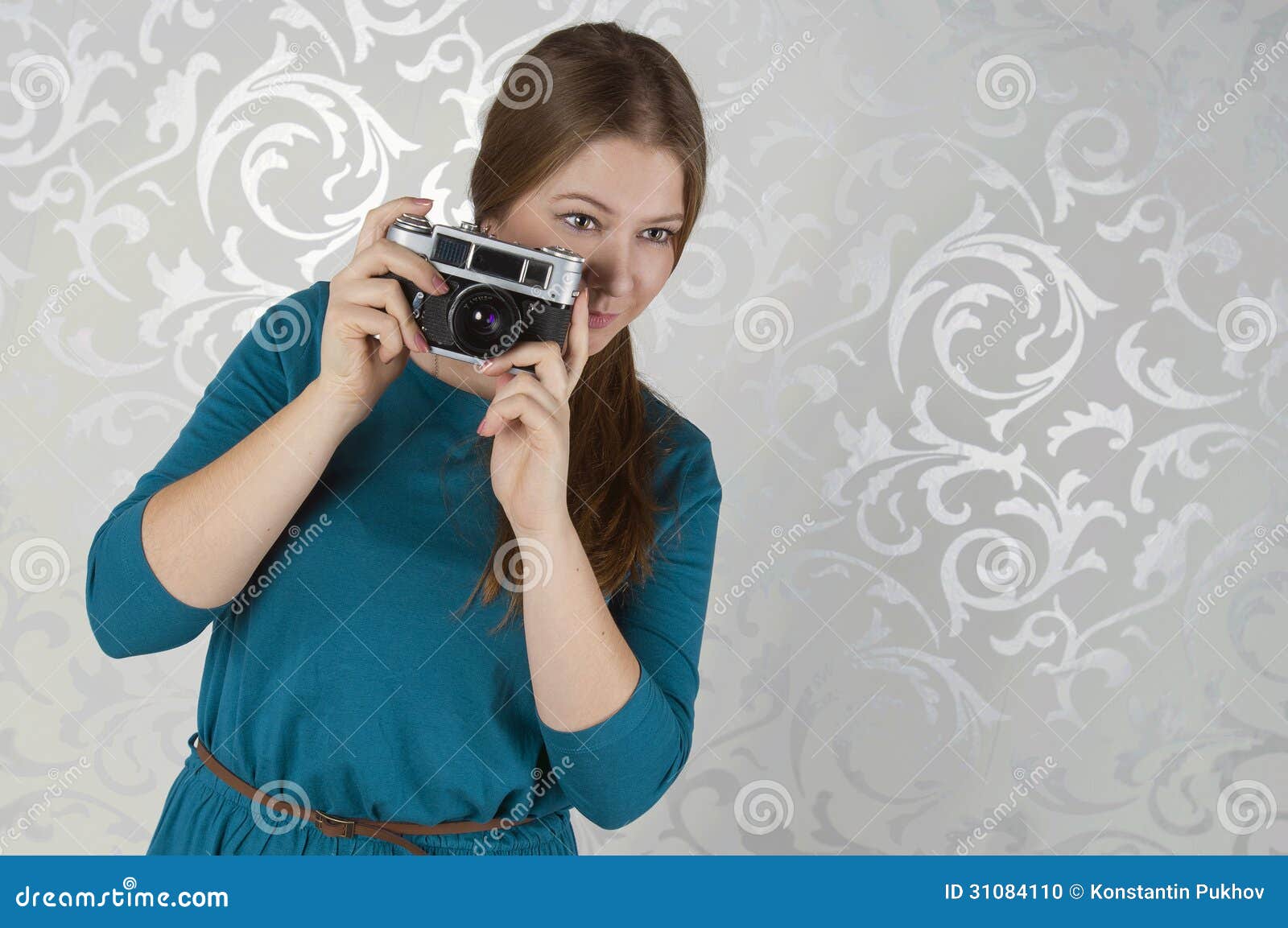 Beautiful girl with camera stock photo. Image of blurred - 31084110
