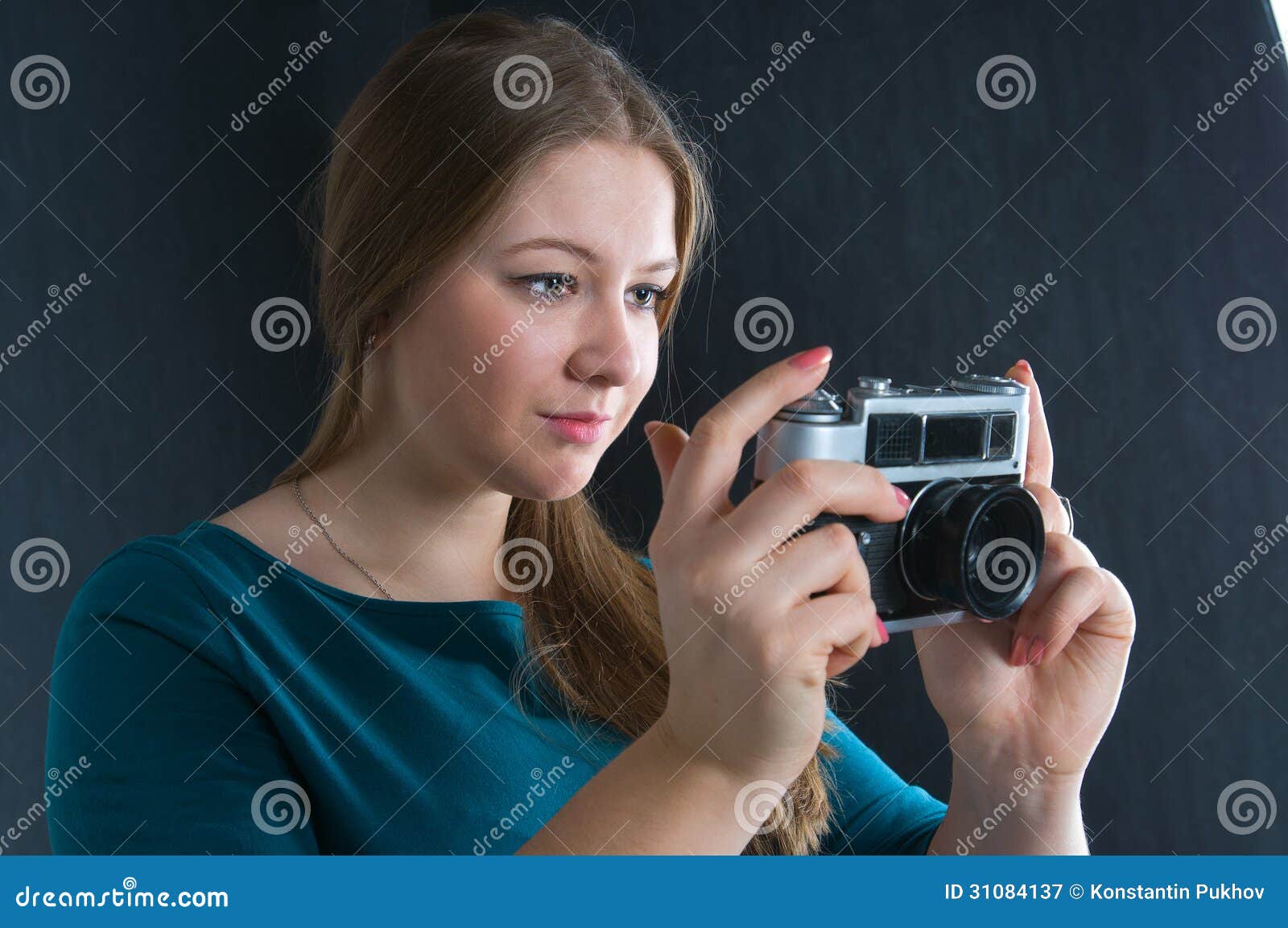 Beautiful girl with camera stock image. Image of photographic - 31084137