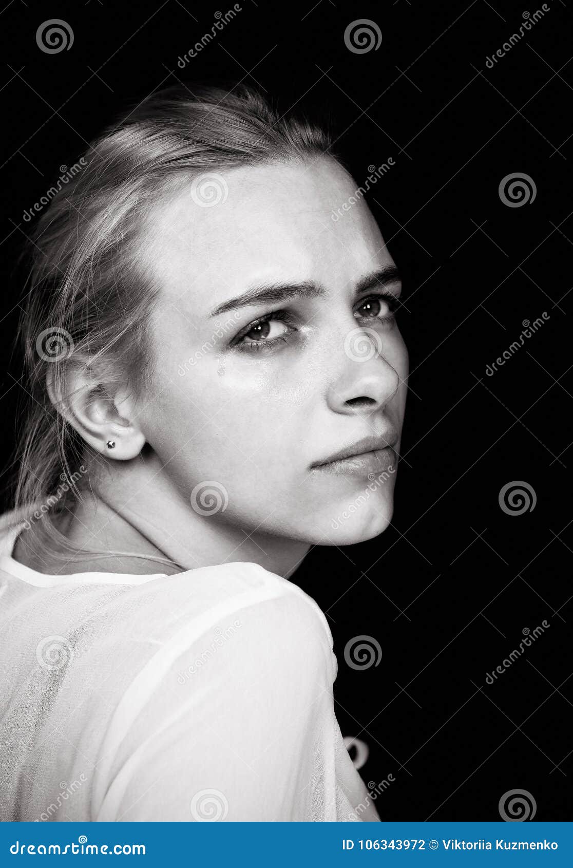 Beautiful Girl Cries Demonstrating Her Sadness And Emotions Stock