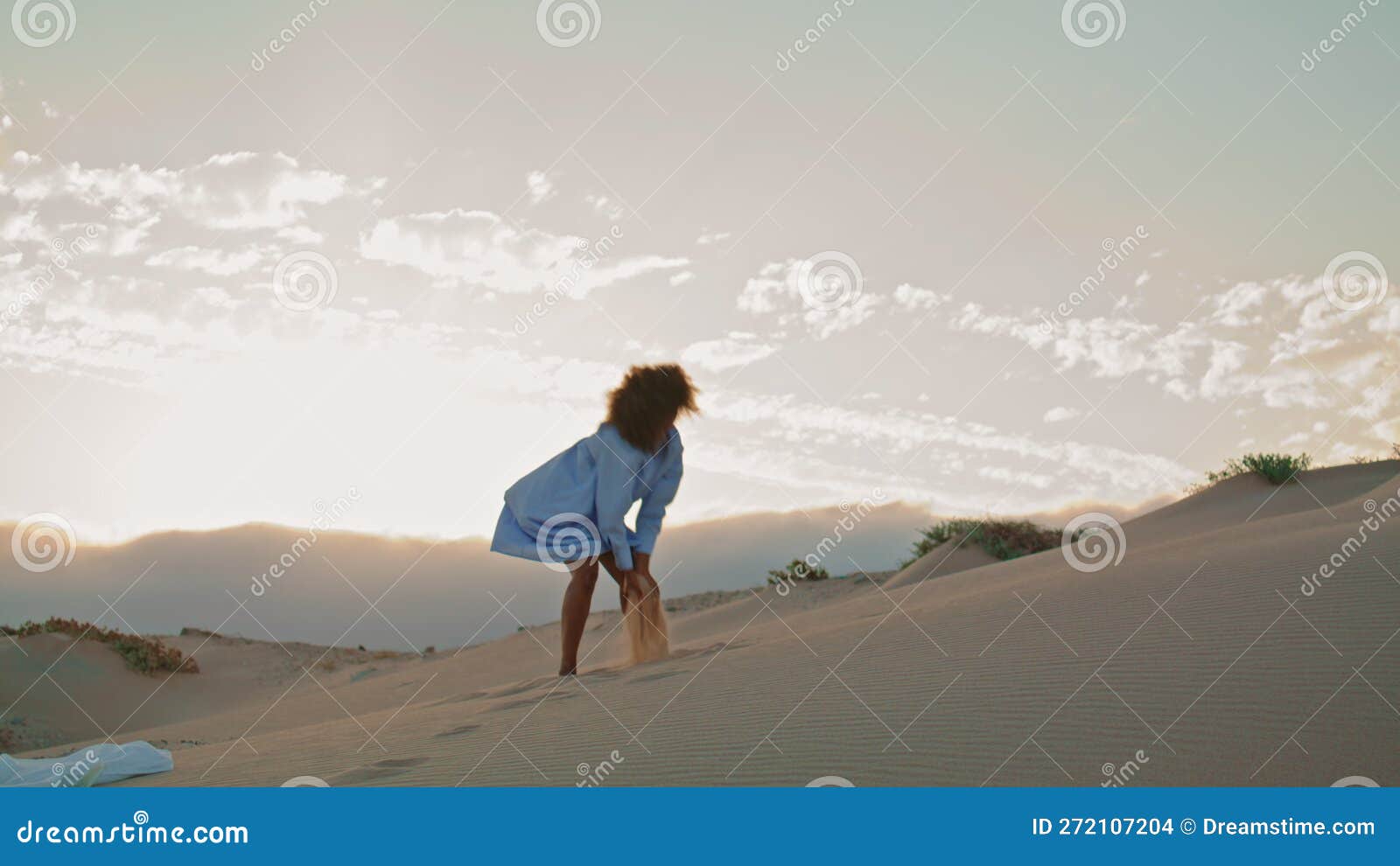Girl Dancer Throwing Sand Performing At Summer Sunset On Dunes Woman