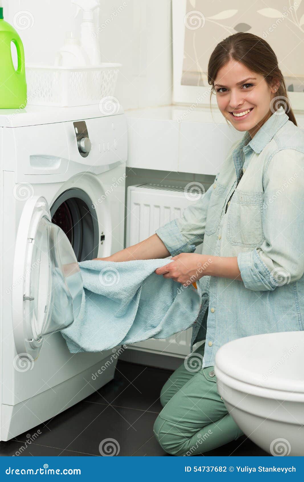 Beautiful Girl Doing Laundry Stock Photo - Image of showing, smiling ...