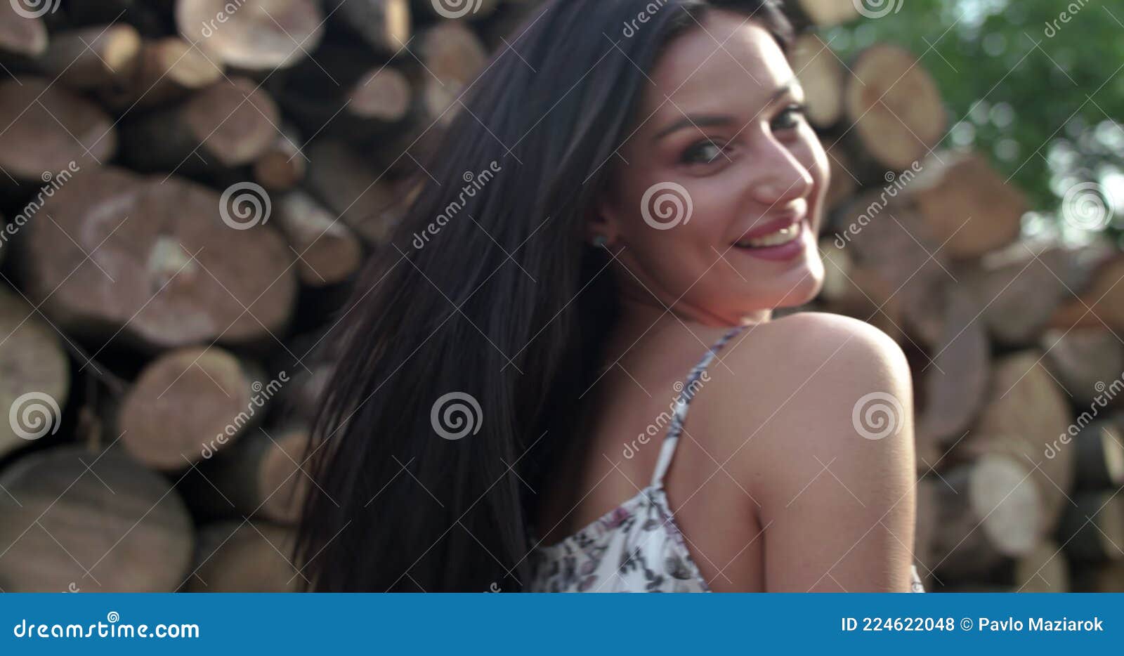 Beautiful Girl In Dress Poses With Hair And Flirts With Camera At Wood Set Stock Footage Video