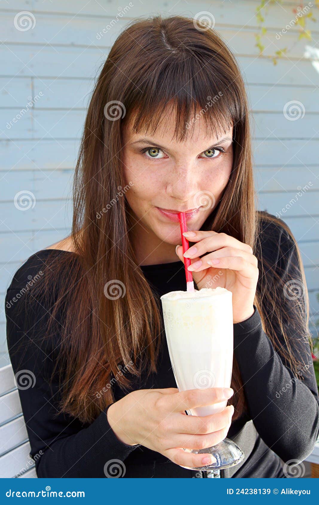 Beautiful Girl Drinking a Milkshake with a Straw Stock Image - Image of ...