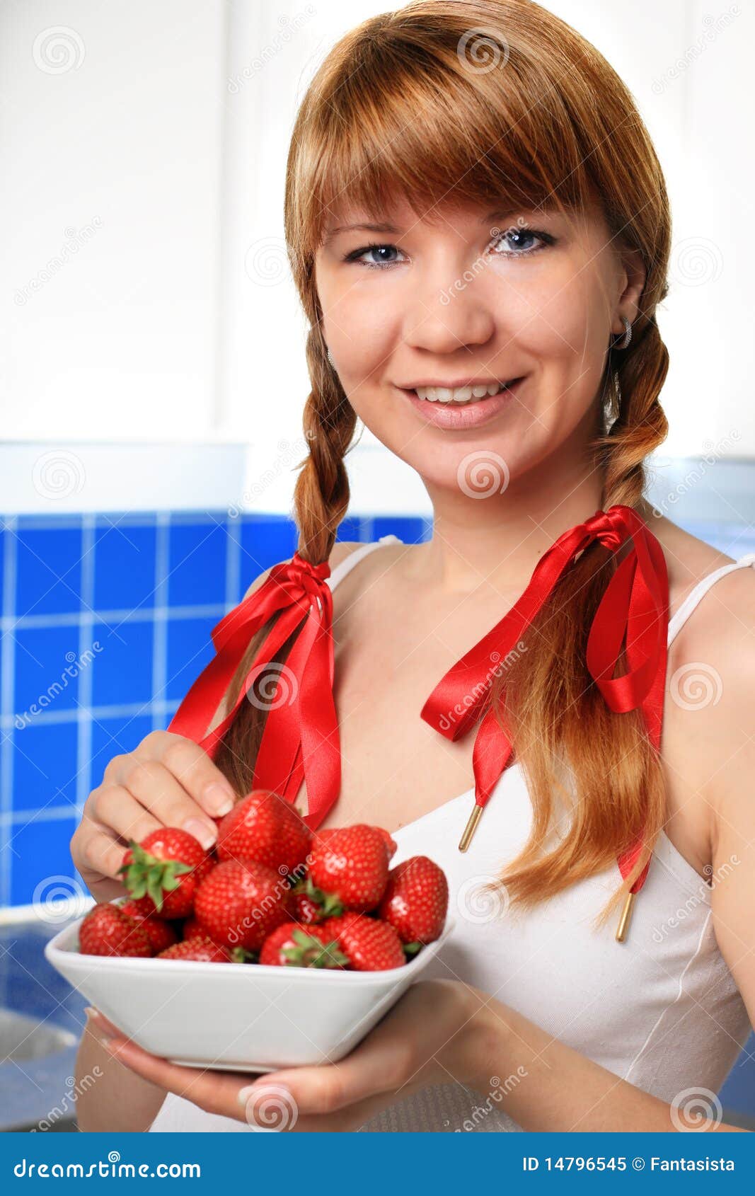 Beautiful Girl Giving Strawberry. Stock Image - Image of kitchen ...