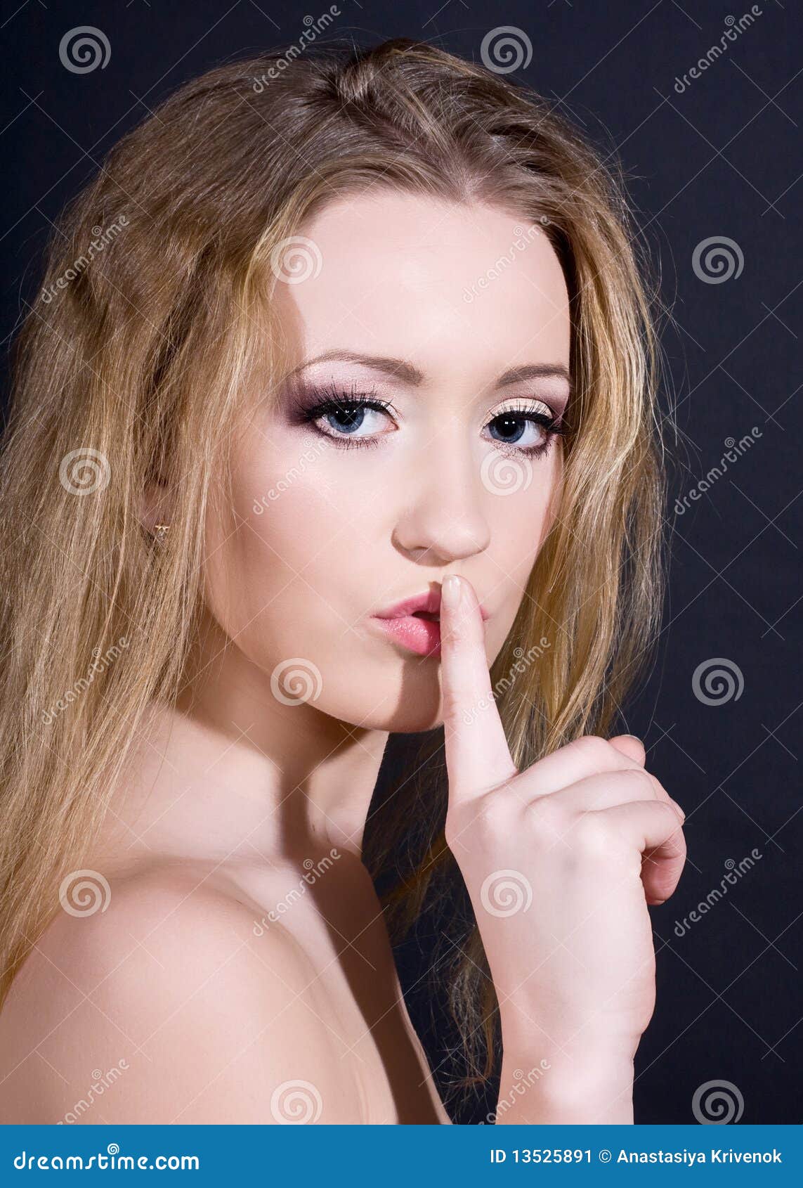 A Beautiful Girl with Her Finger on Her Lips Stock Image - Image of ...