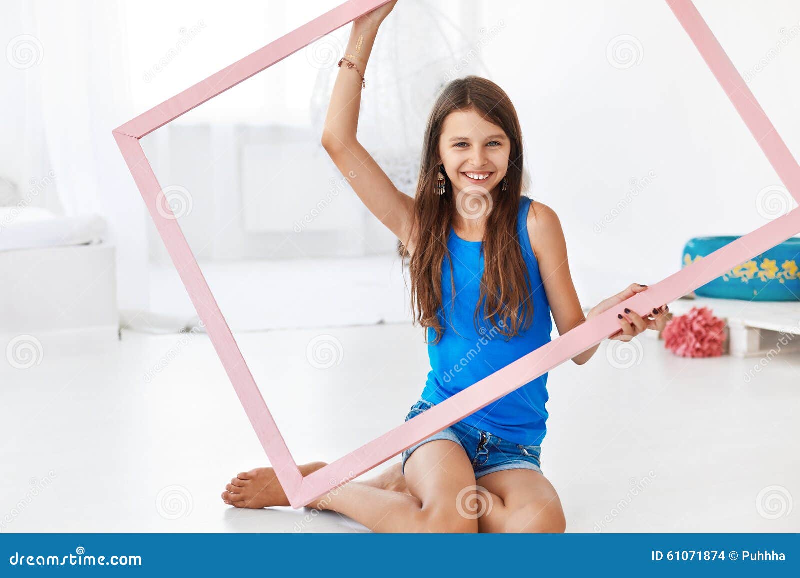 Beautiful Girl Holding a Frame and Smiling Stock Photo - Image of smile ...