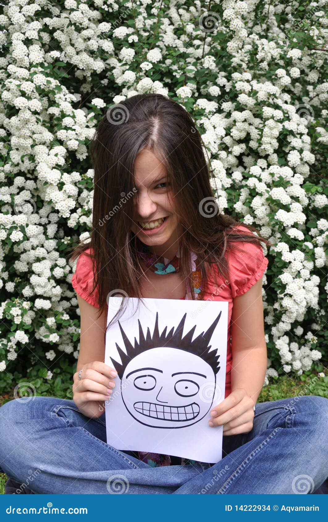 Beautiful Girl Holding a Paper with a Drawn Face E Stock Photo - Image ...