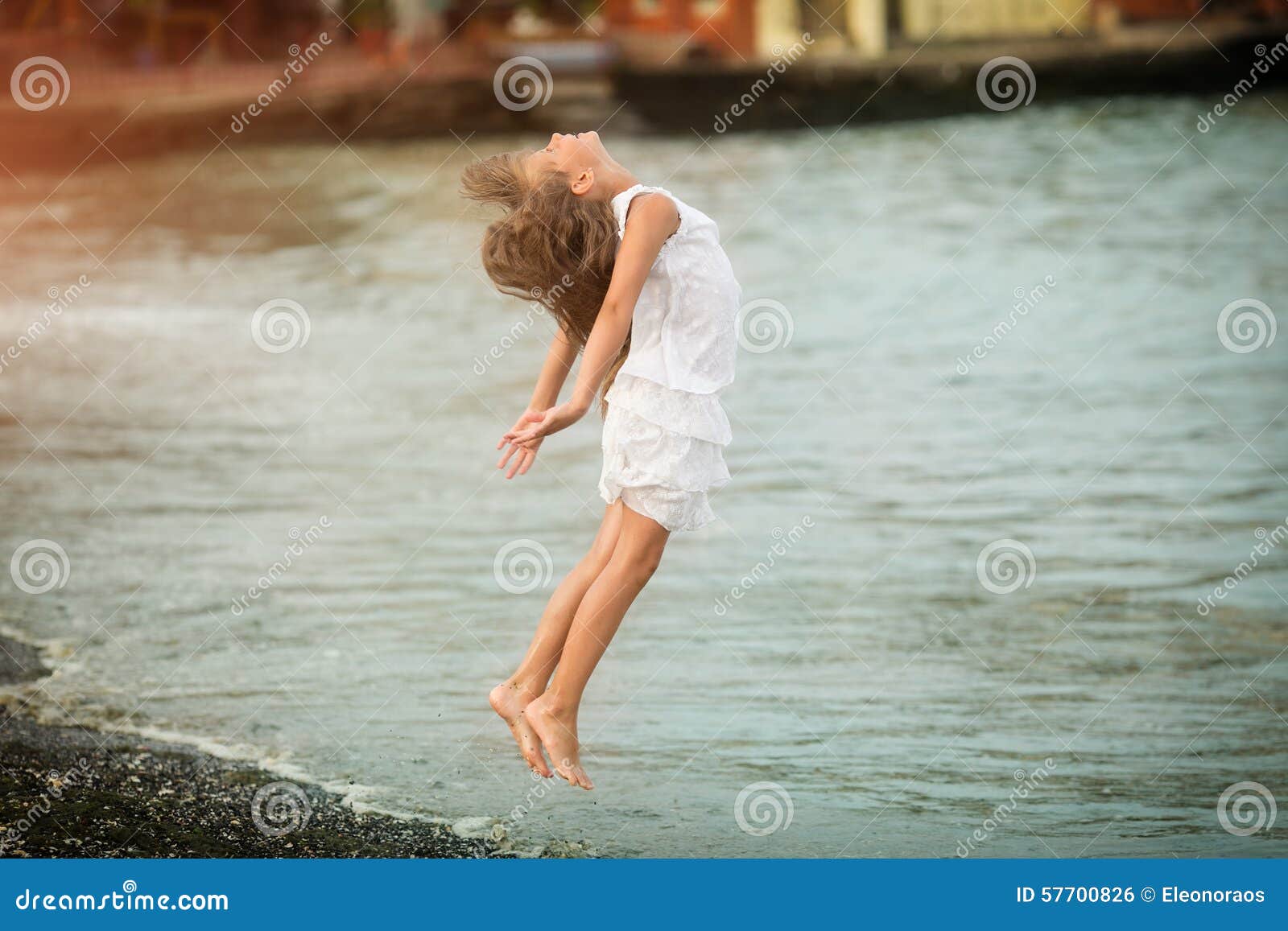 Beautiful Girl Jumping through the Waves Stock Photo - Image of person ...