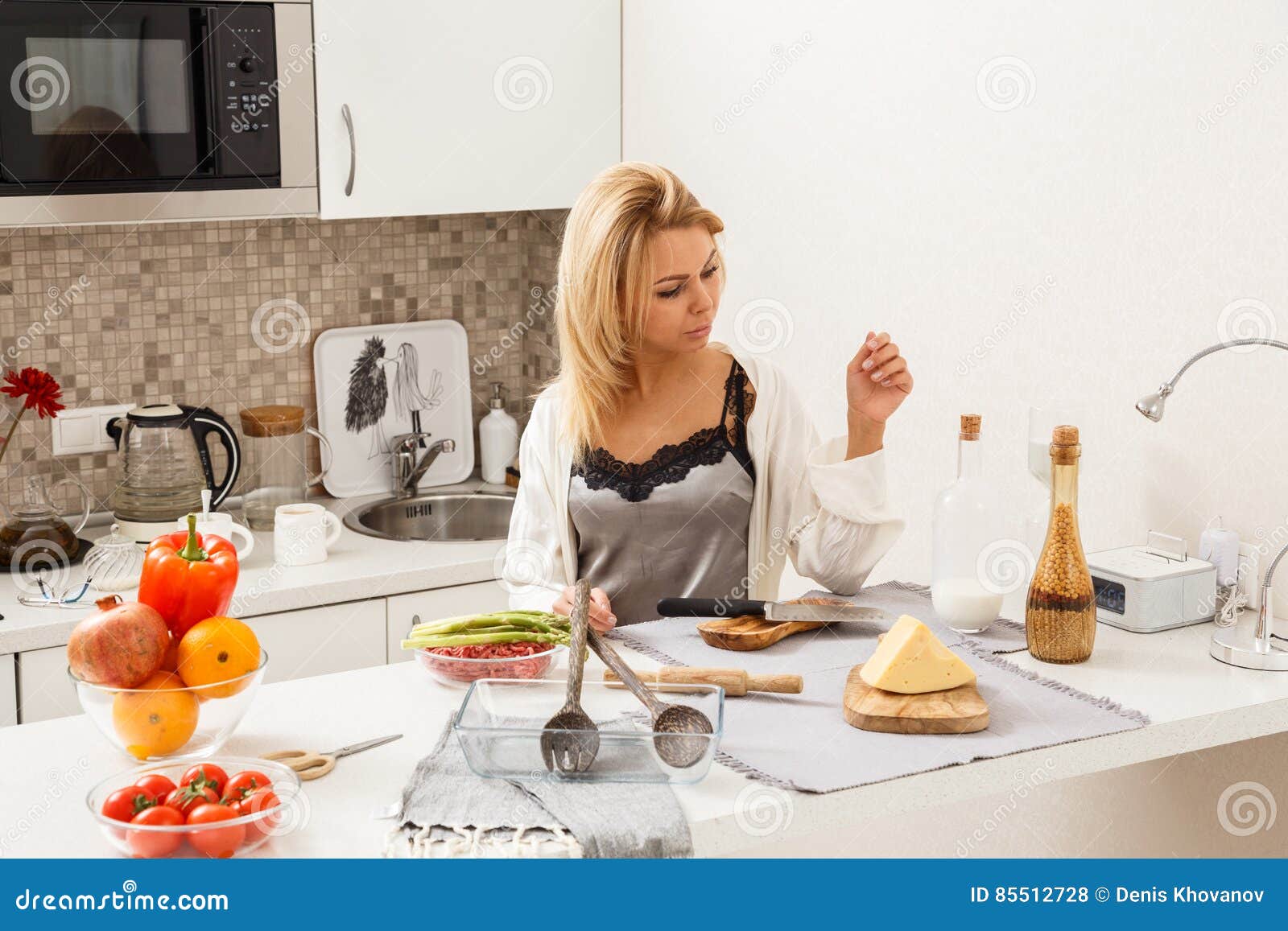 Beautiful girl in kitchen stock photo. Image of beauty - 85512728