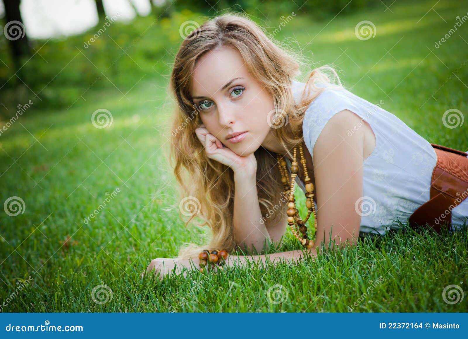Beautiful Girl Lies on the Grass Stock Photo - Image of clear ...