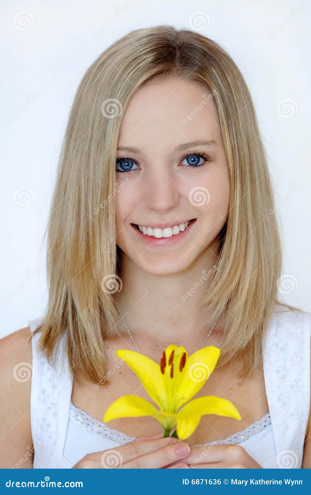 Beautiful girl with lily stock photo. Image of blond, copy - 6871636