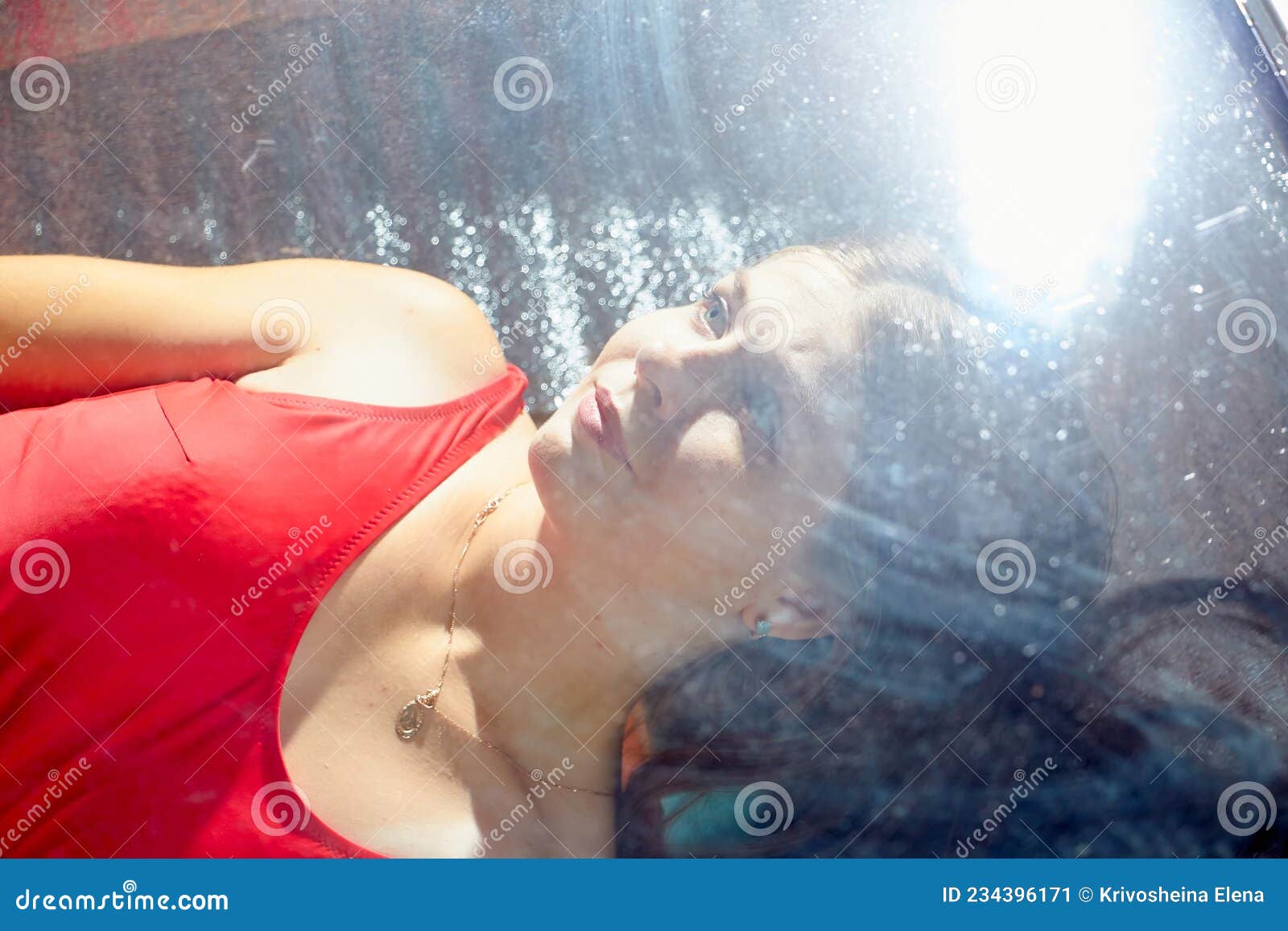 Beautiful Girl With Long Hair Underwater In The Swimming Pool Young