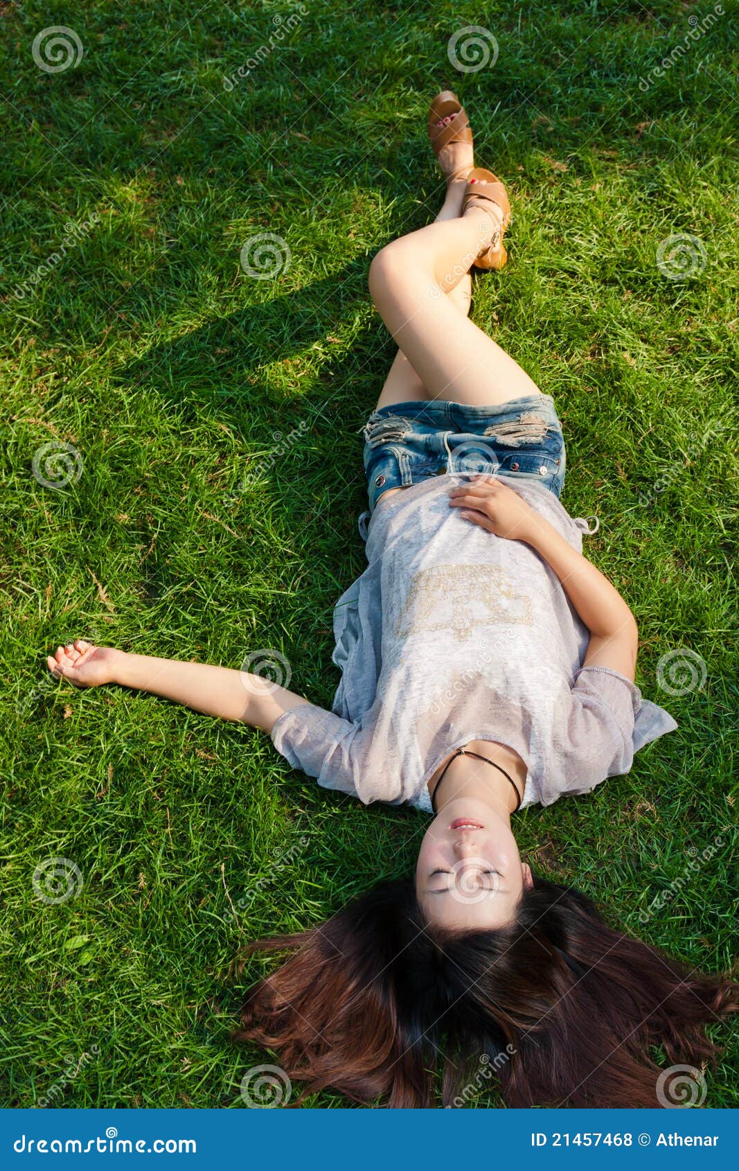Beautiful Girl Lying Down at Grass Stock Photo - Image of color, eyes ...