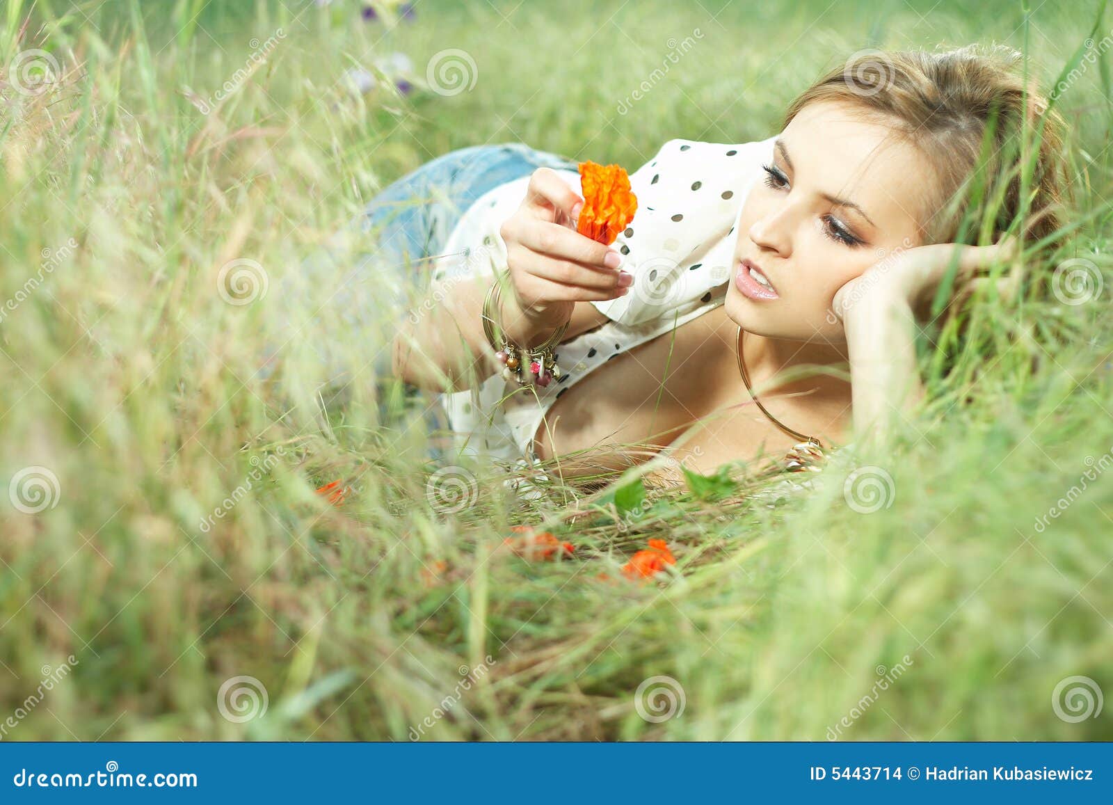 Beautiful Girl Lying Down Of Grass Royalty Free Stock Image