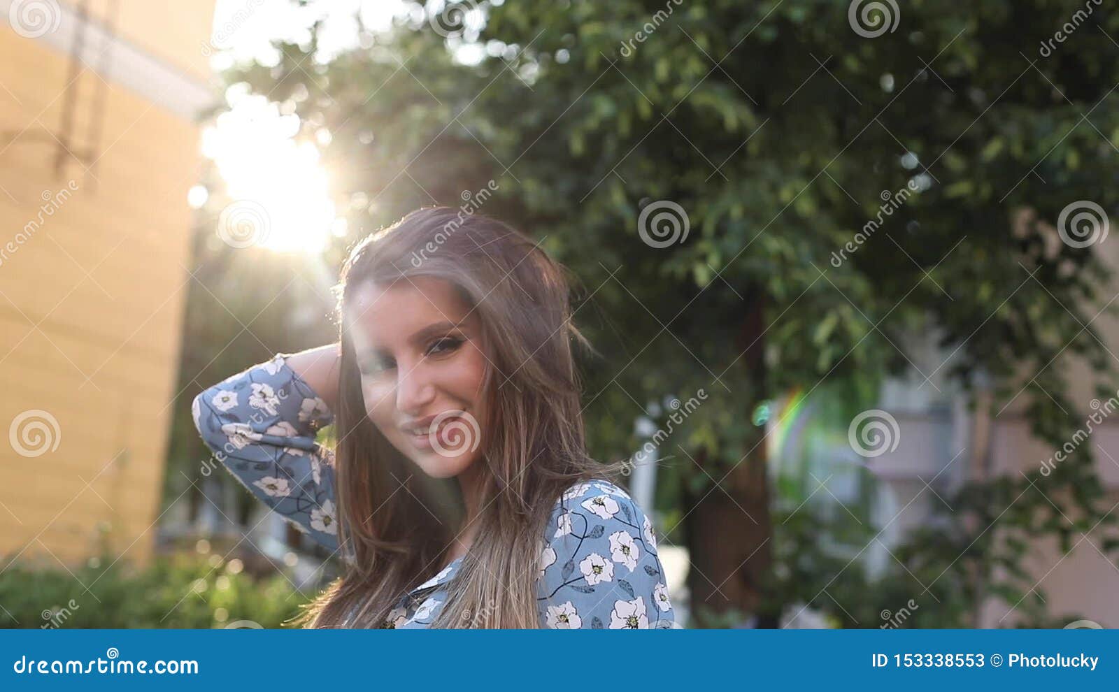 Beautiful Girl With Makeup Smiling And Touching Her Hair Stock Video